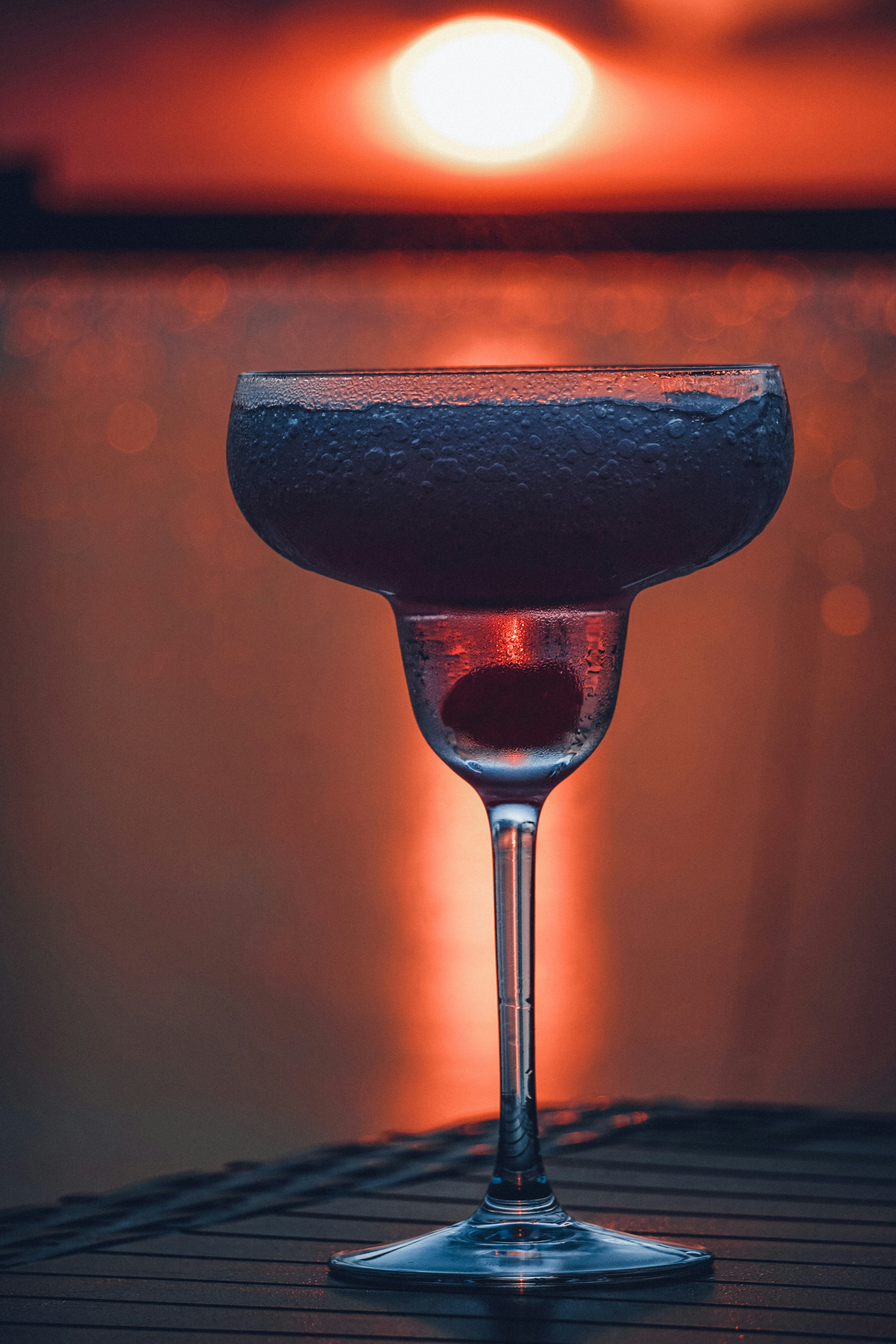 Chalice of Ember: Frosted Glass Framed by Sunset