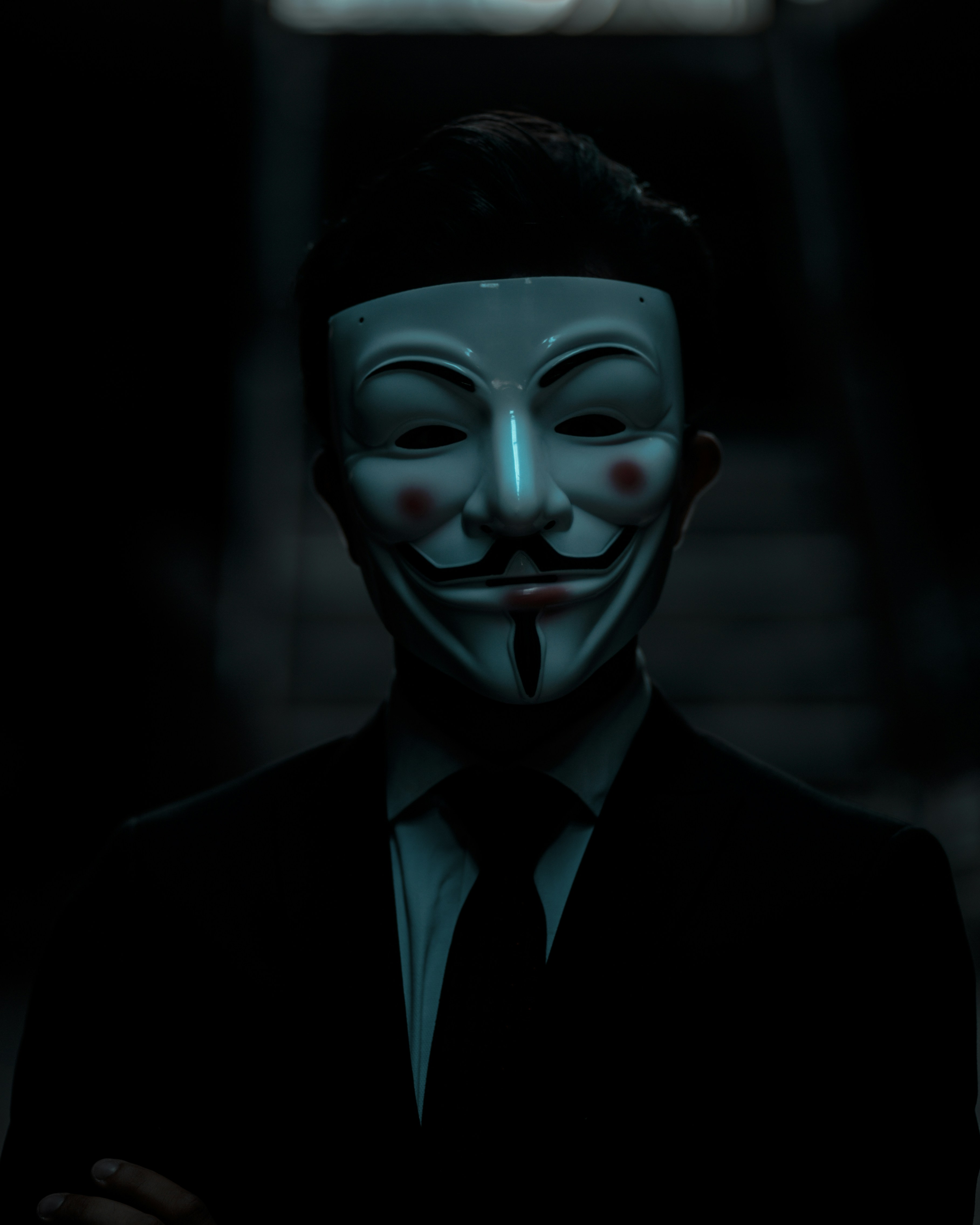 Noir Teal Masquerade: Anonymous Portrait in Shadowed Glow