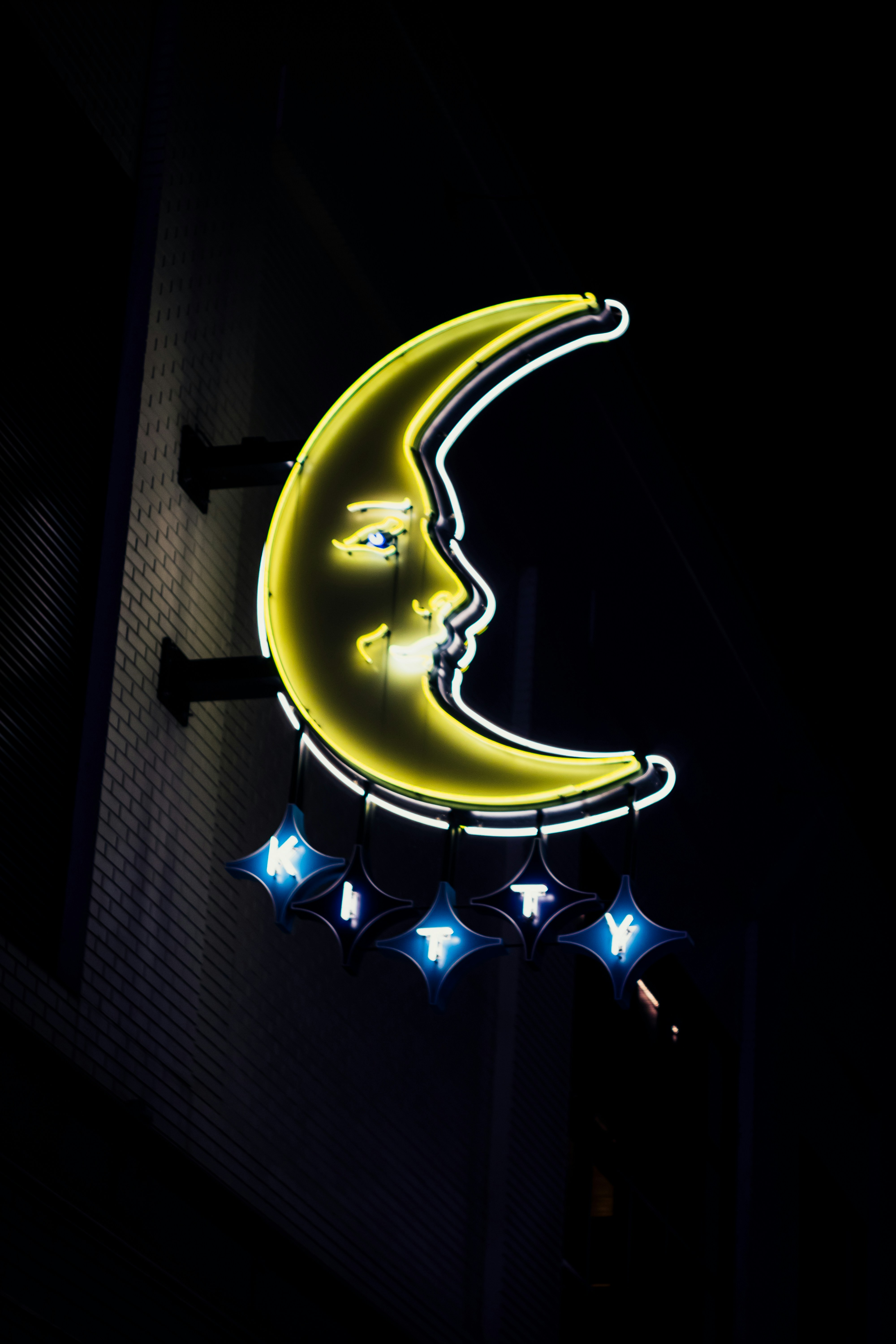 Neon Crescent: Moonlit Marketing Sign in Amber Night