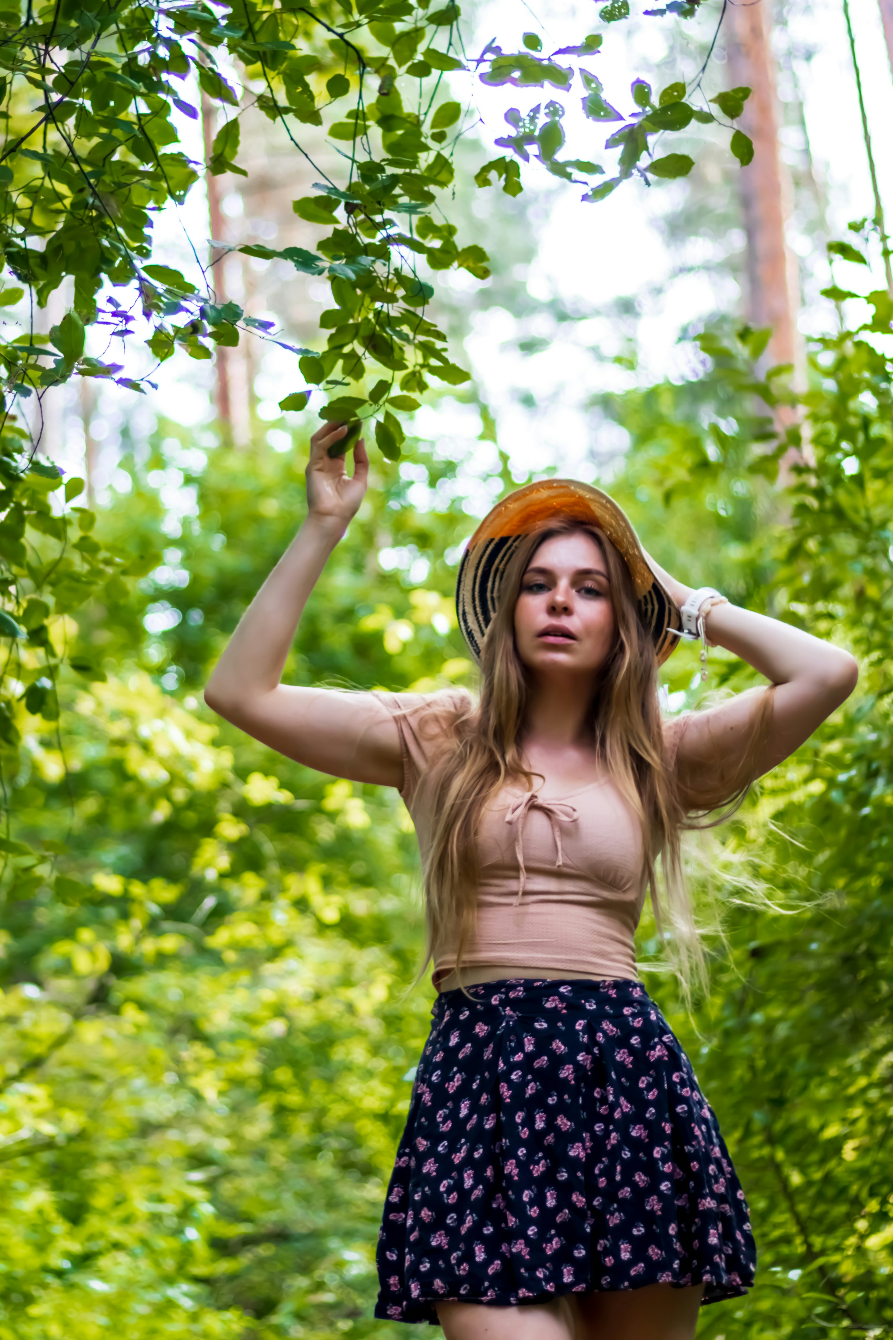 A person holding a stick photo – Free Skirt Image on Unsplash