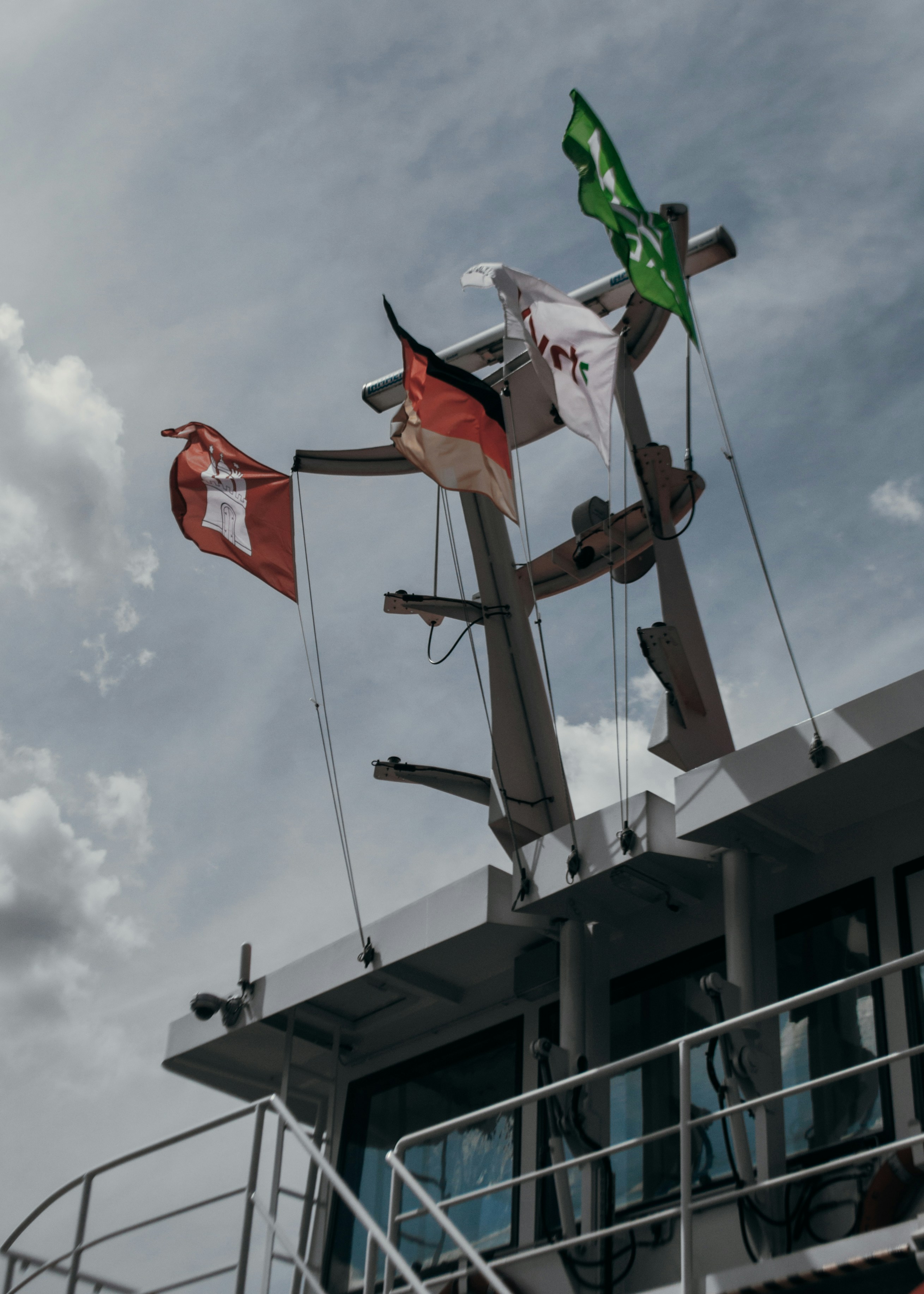A group of flags on a boat photo – Free Hamburg Image on Unsplash