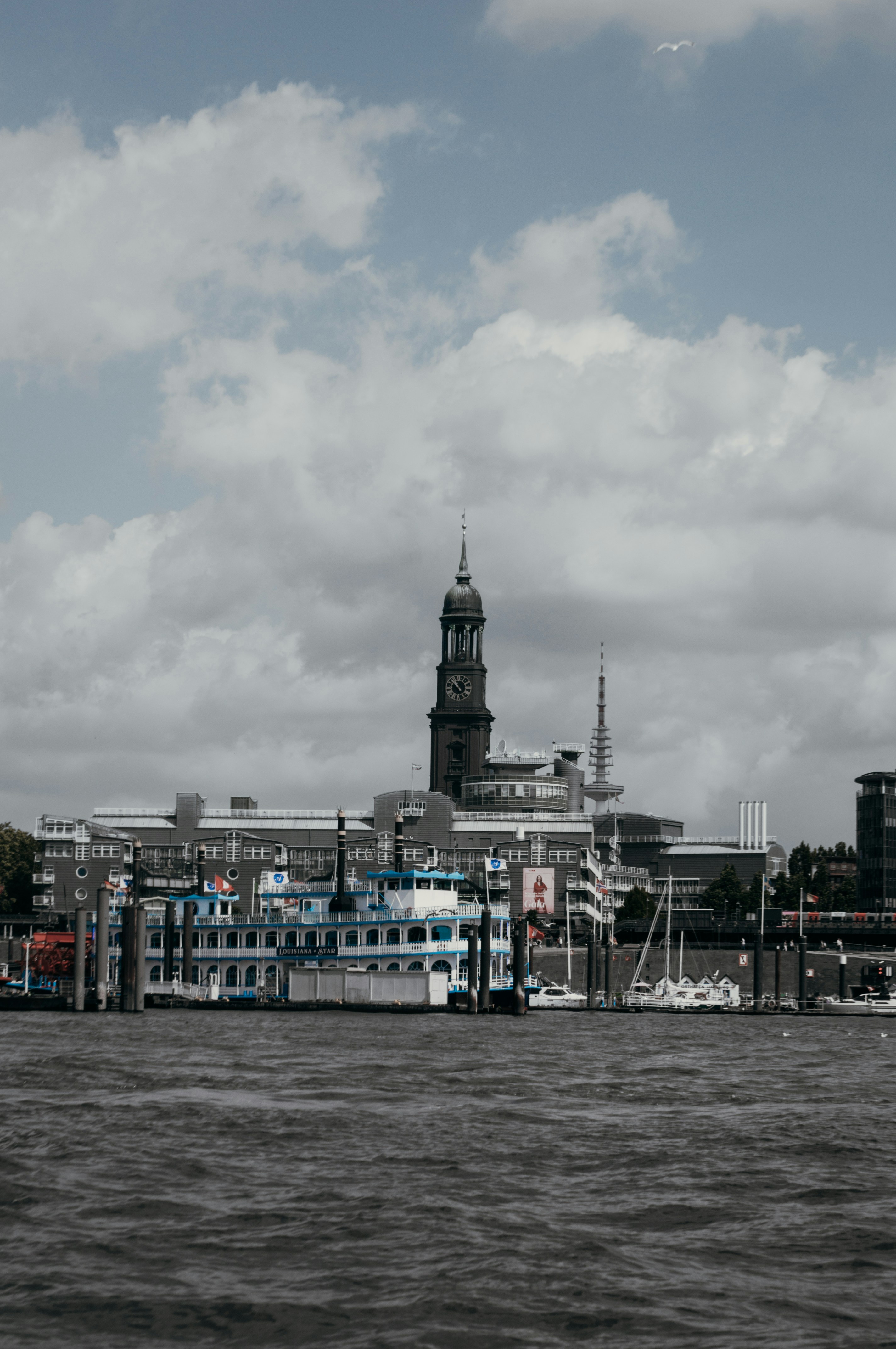 Clocktower Over the Harbor: A Quiet Moment by the Quay