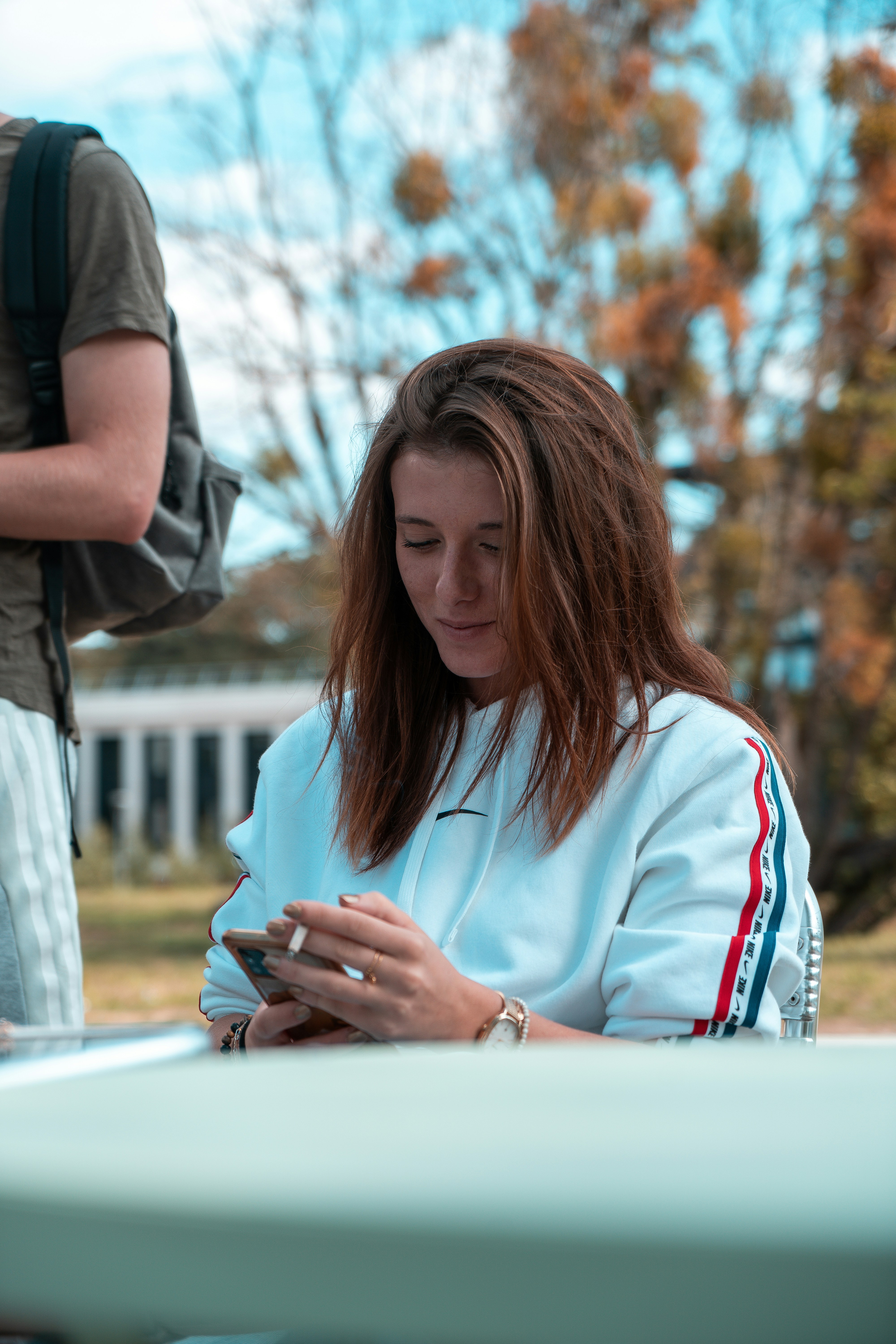 Soft Focus Portrait: Selfie Moment Under Autumn Trees