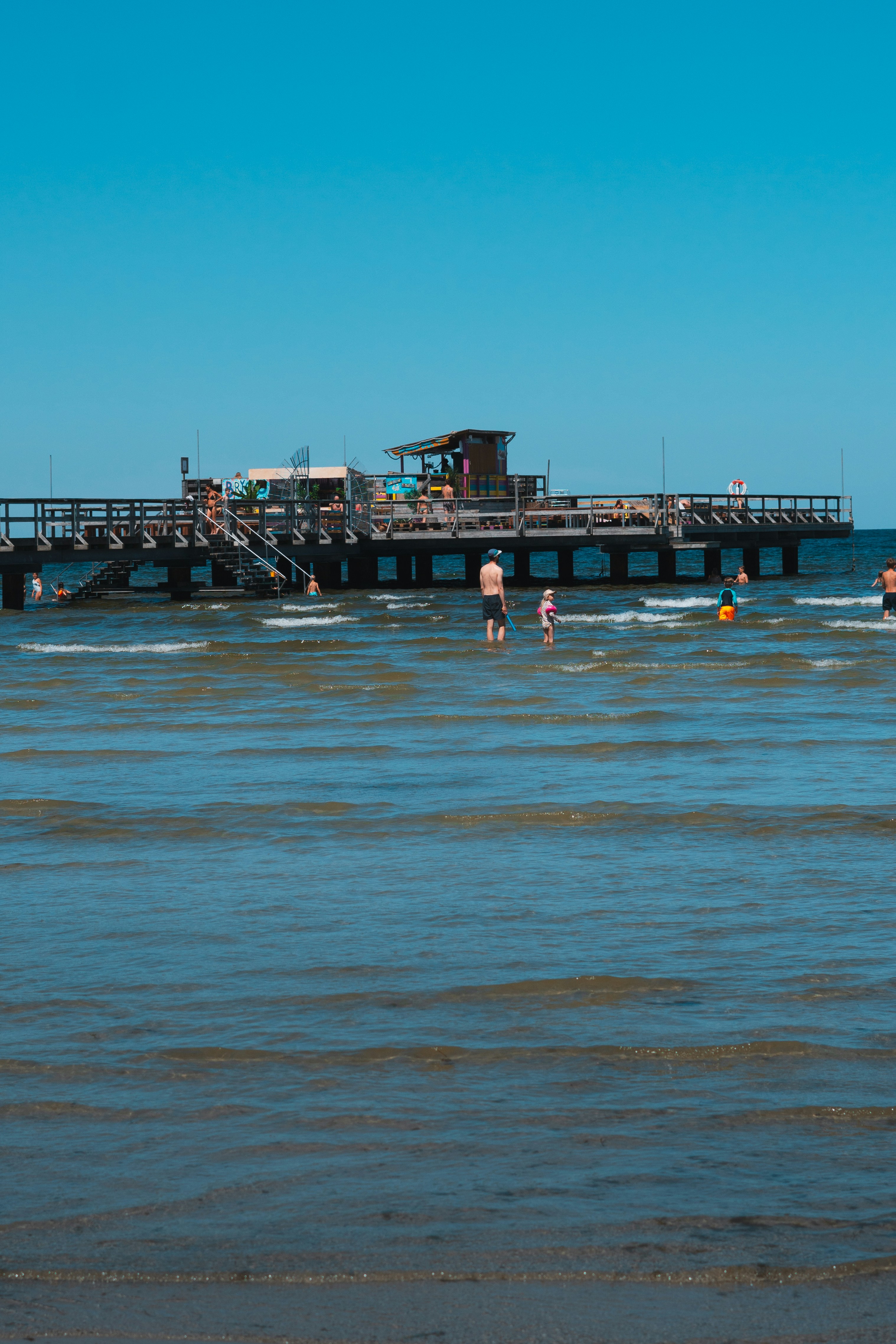 people surfing in the sea