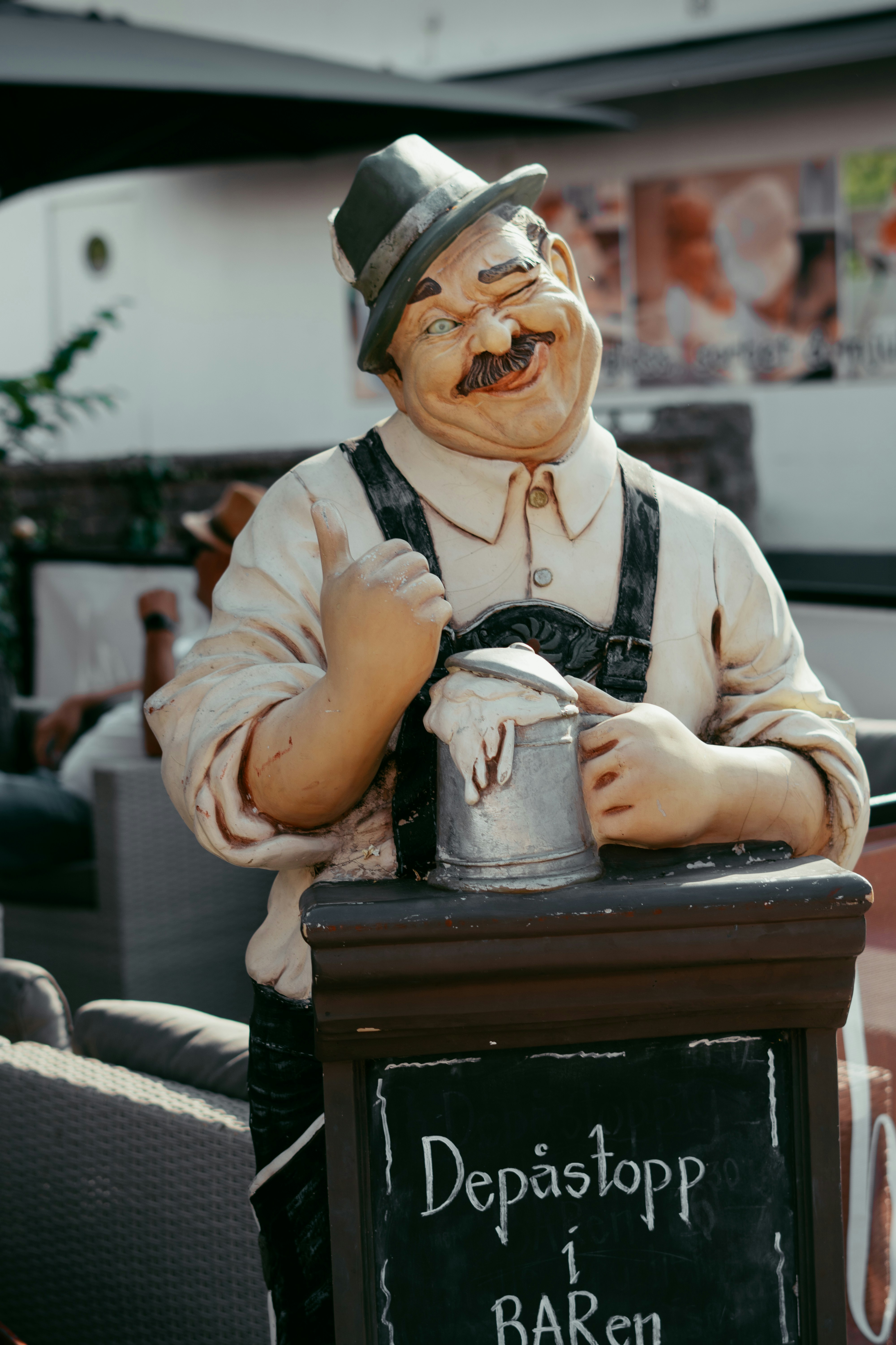 Jovial Gardener Statue: A Smile, a Watering Can, and Outdoor Charm