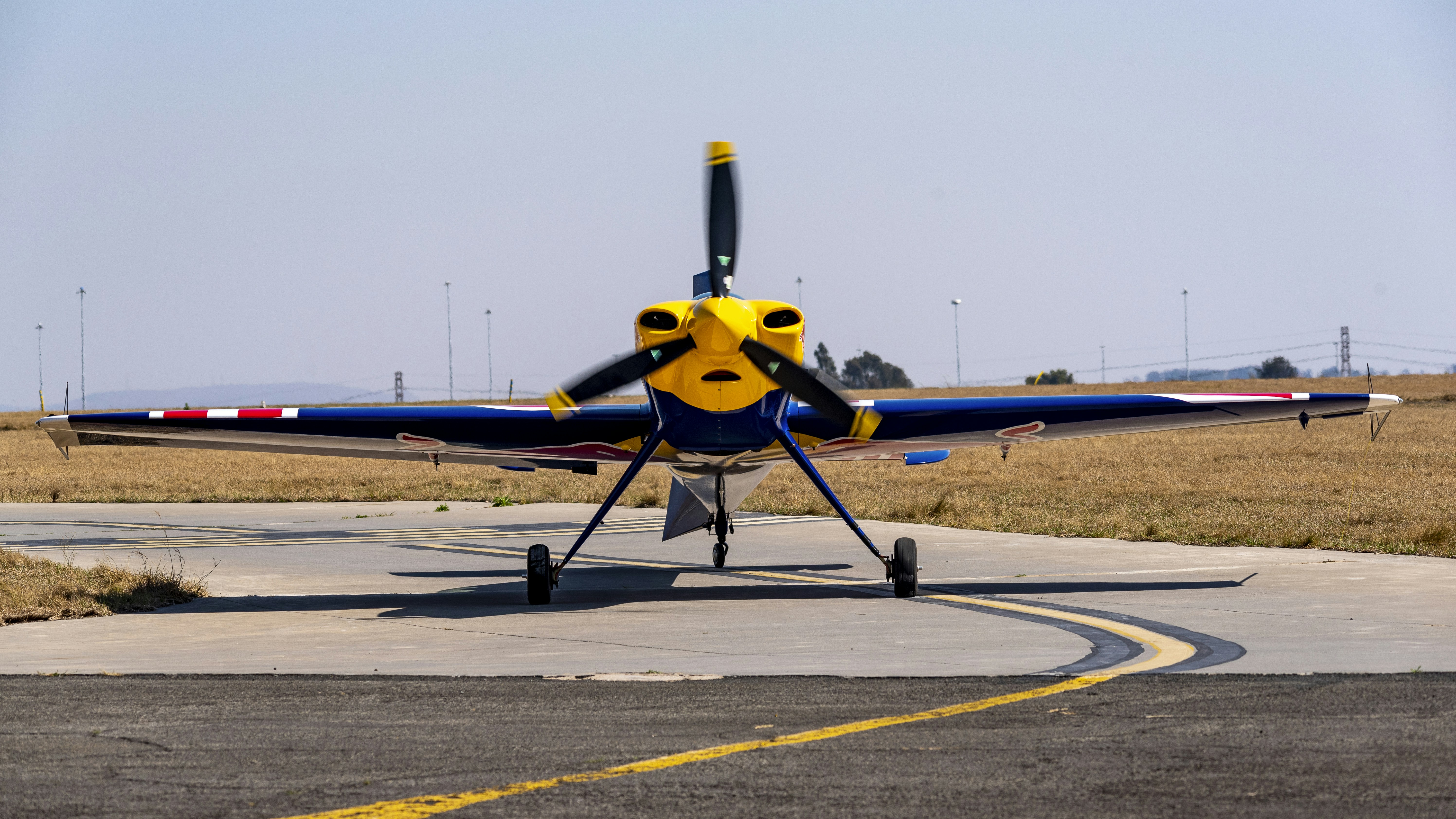 A small yellow plane on the runway photo – Free Airplane Image on Unsplash