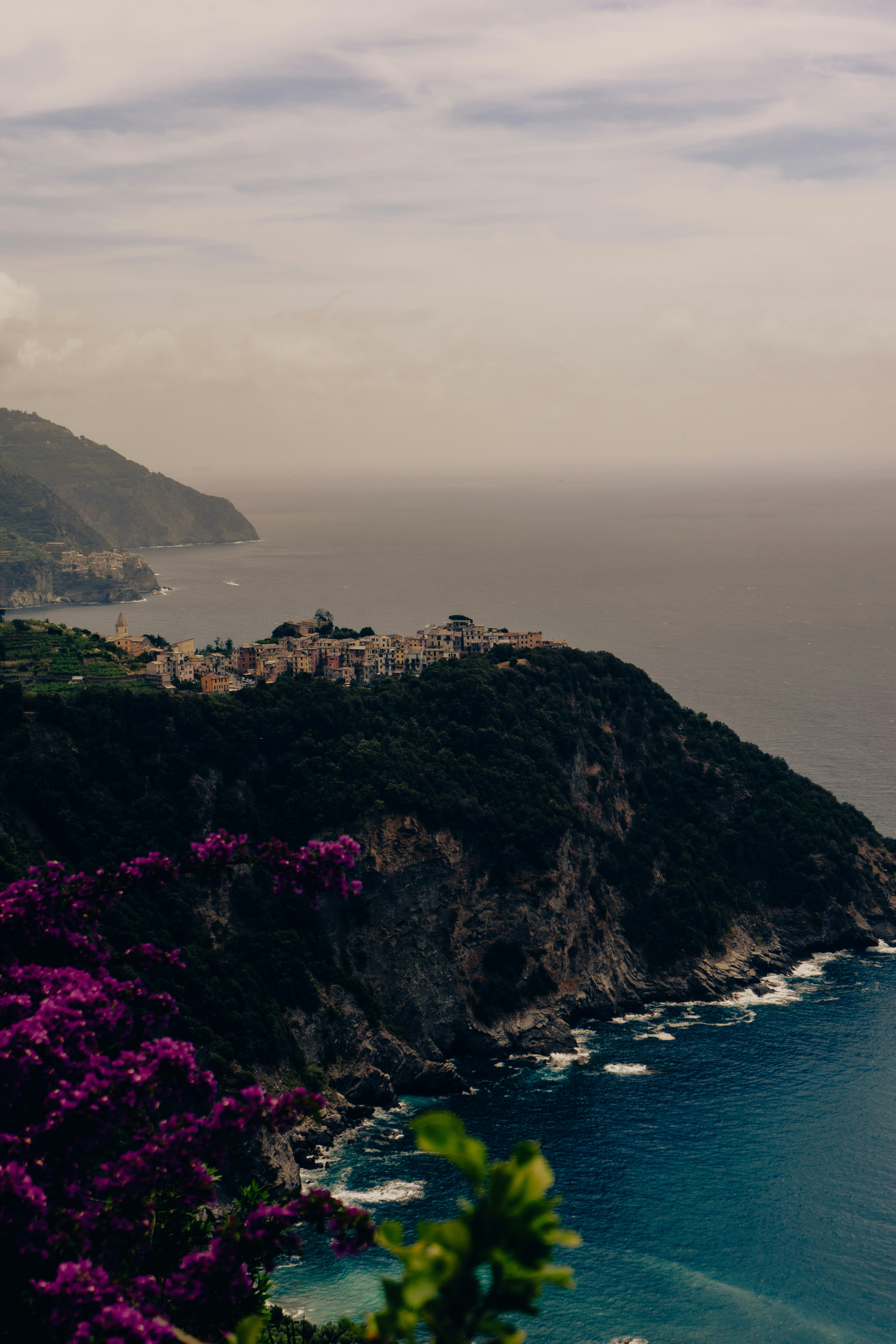 Cliffside Village Overlooking a Turquoise Sea at Dusk