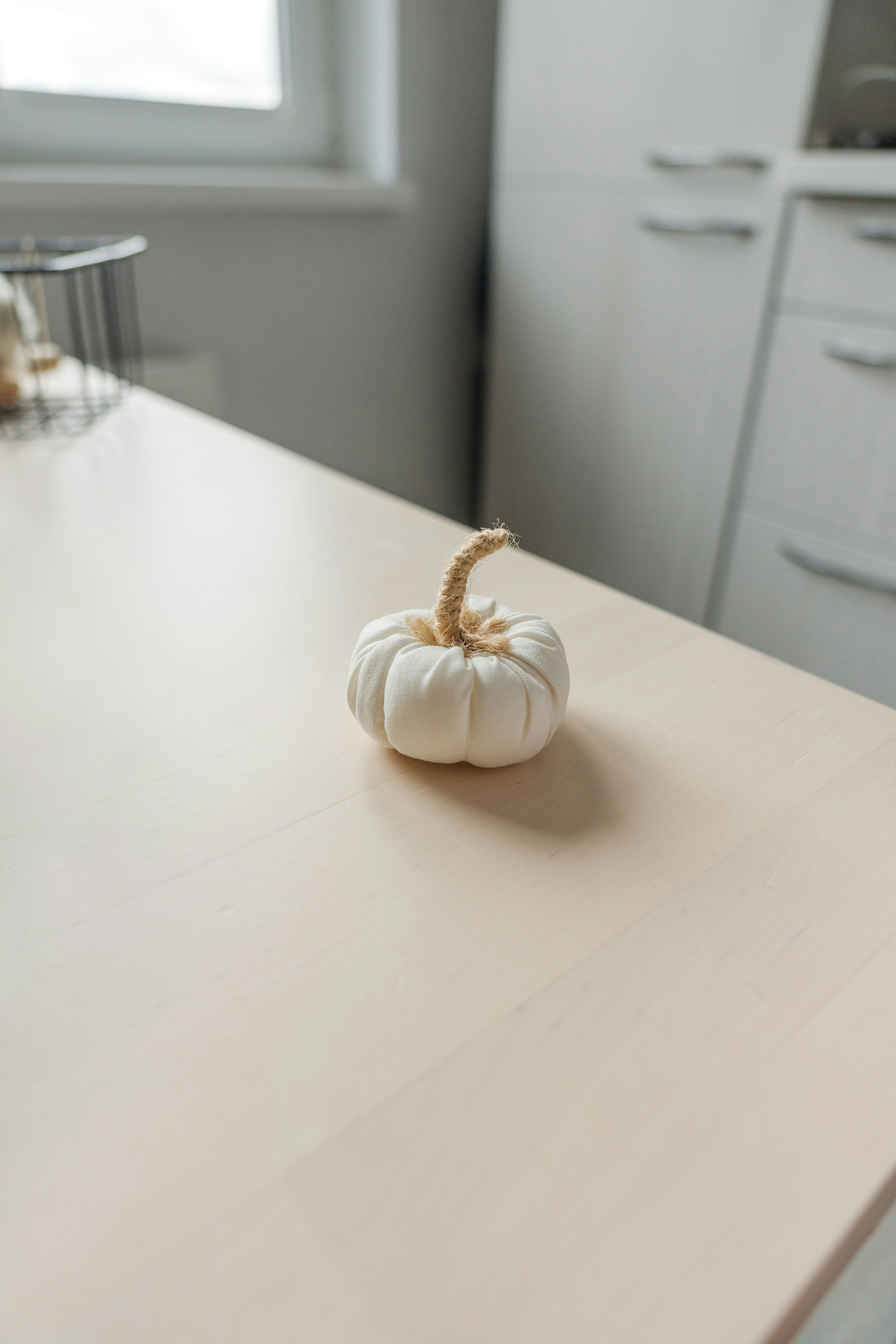 a small white object on a white surface