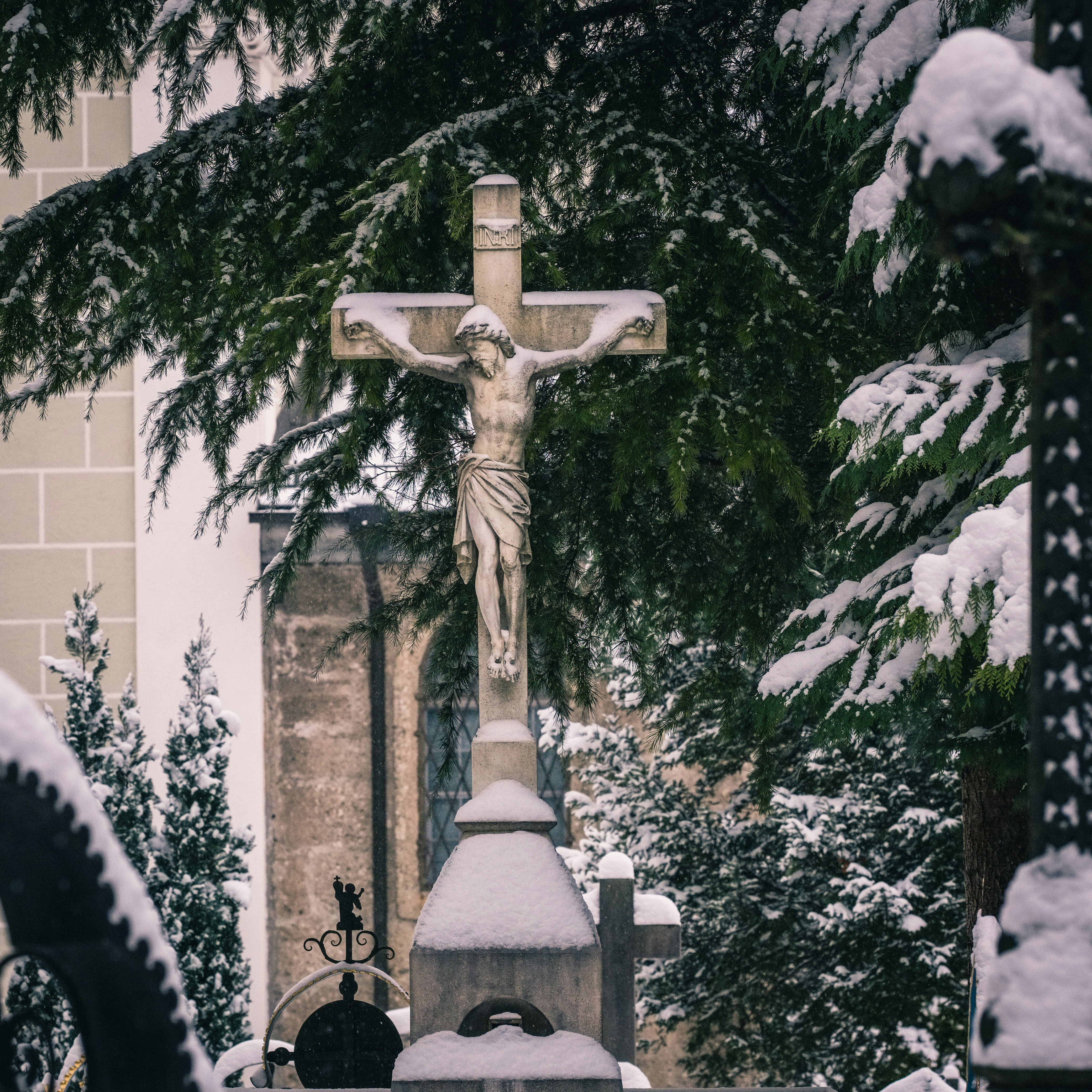 Snowbound Cross: a wintery shrine framed by snow-dusted pines