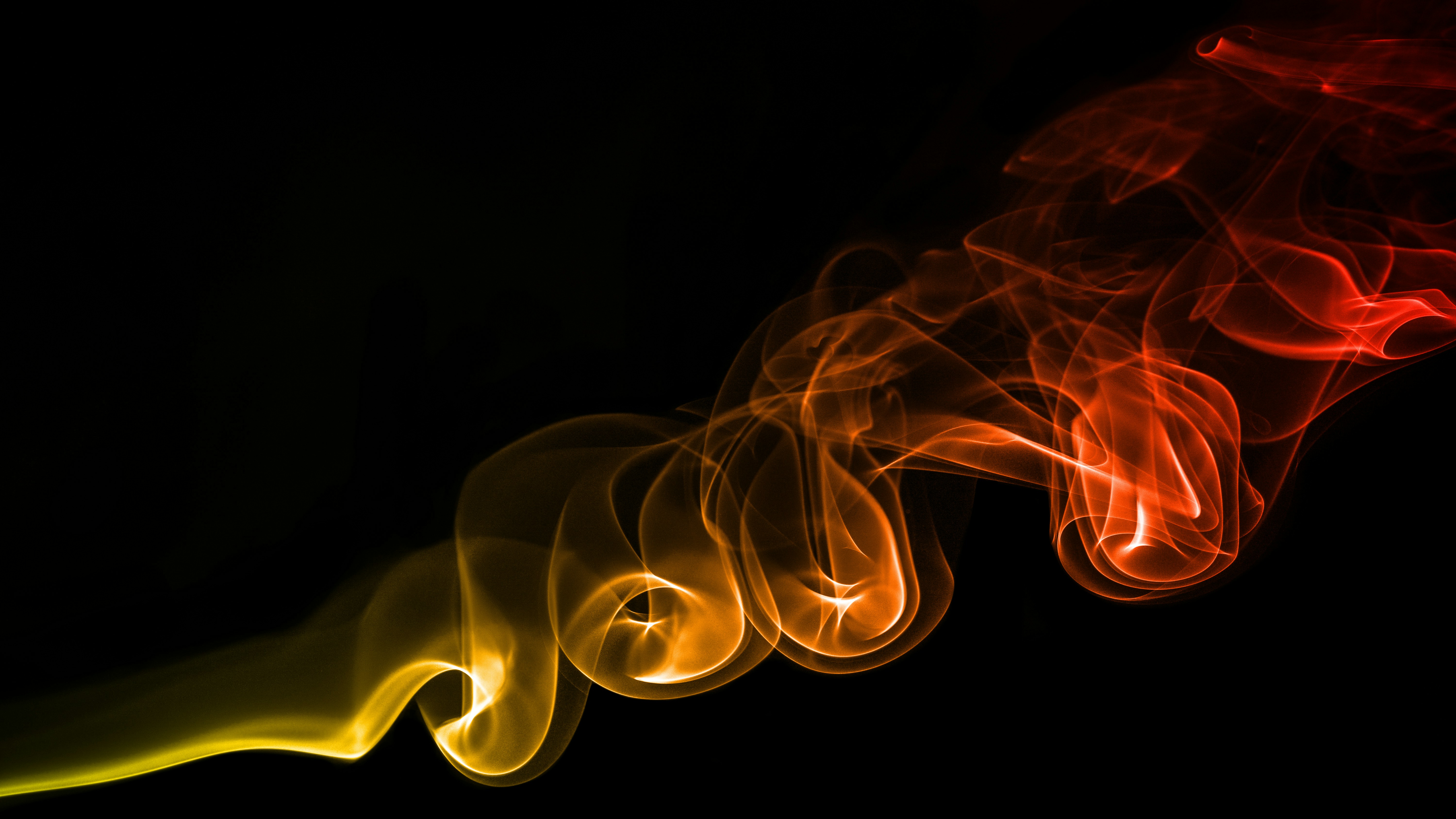 Abstract illustration of swirling smoke in vibrant yellow and red hues against a black background.