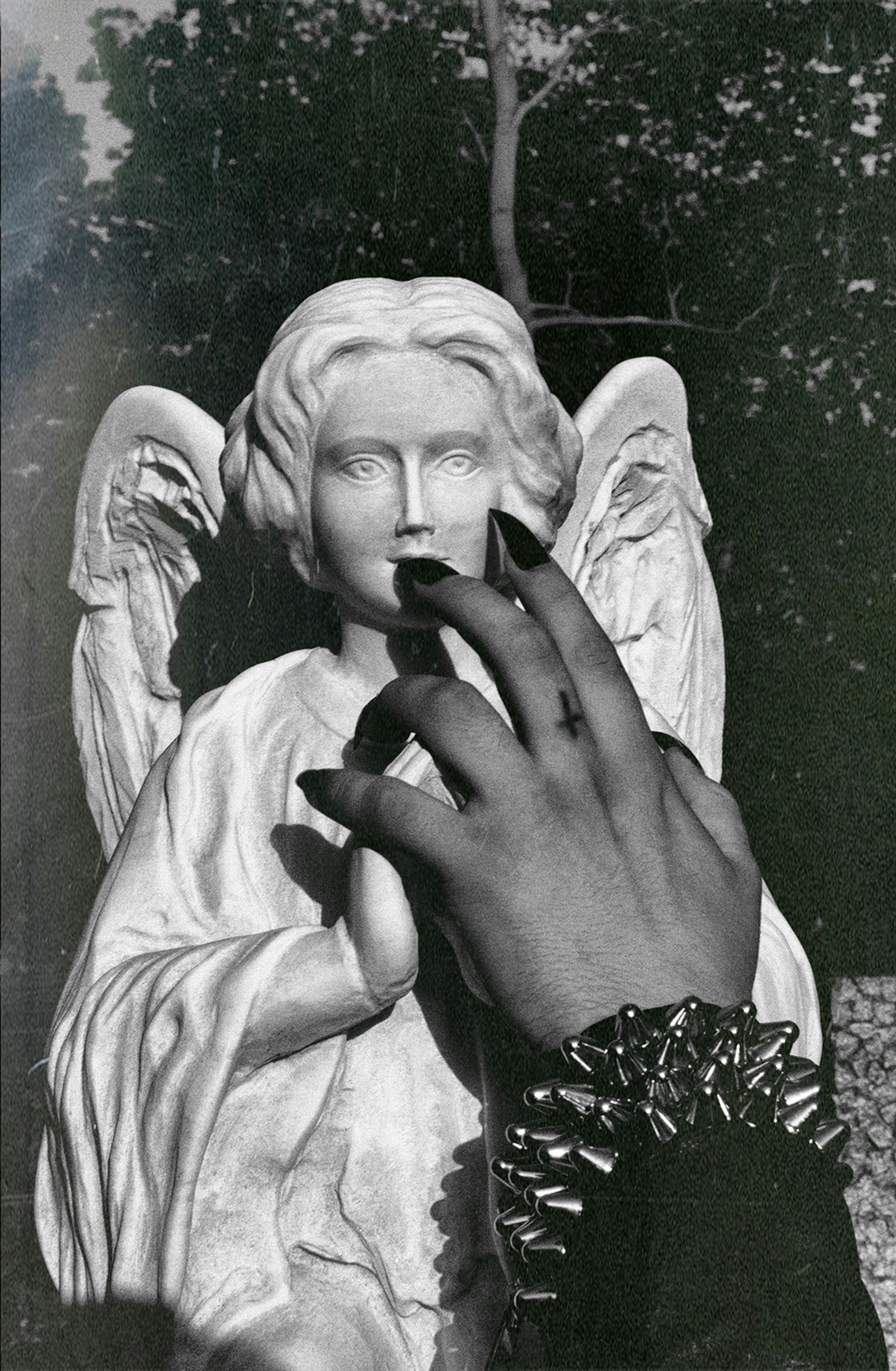 A statue of a person holding the hands up photo – Free Grey Image on ...