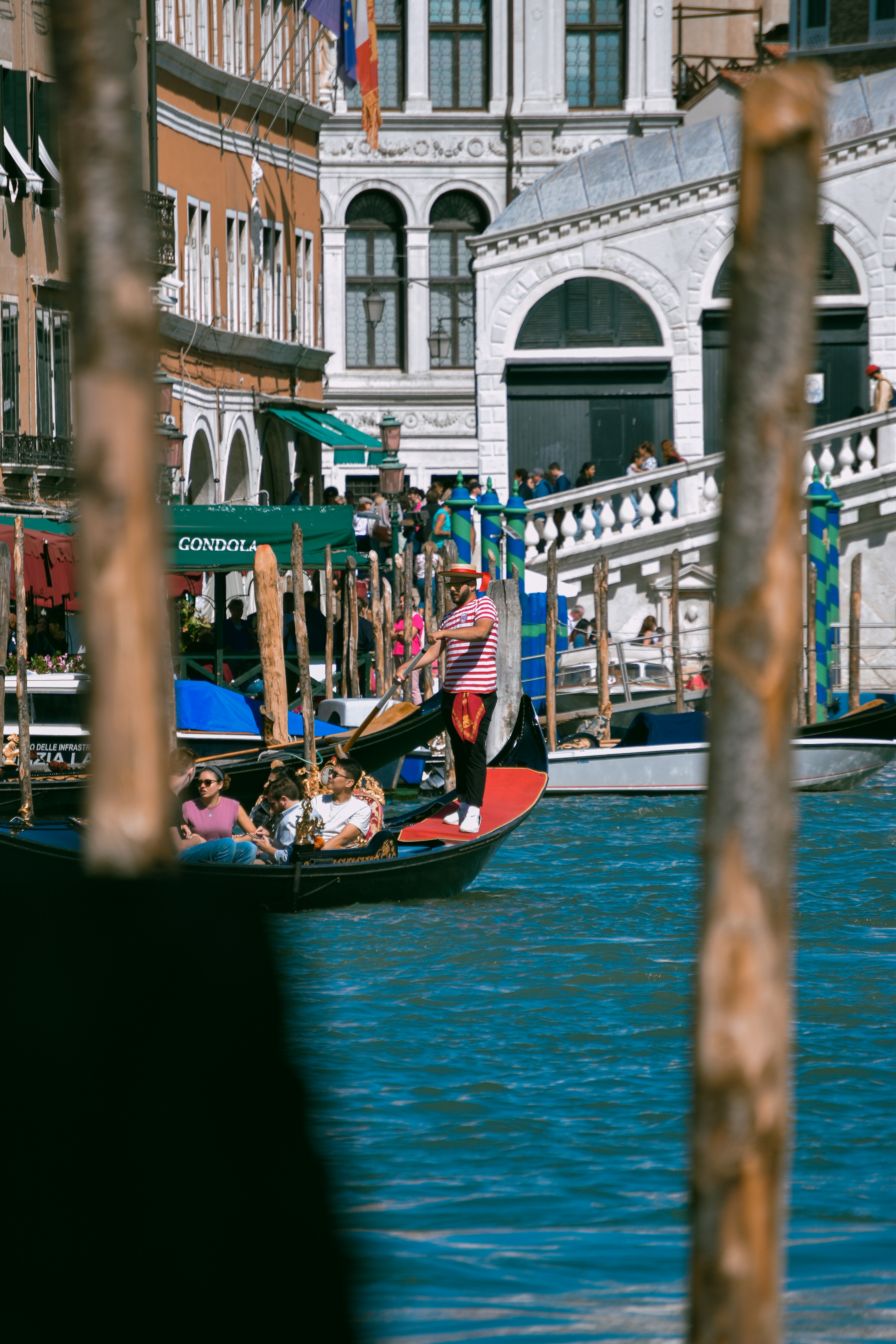 a person on a boat in a canal