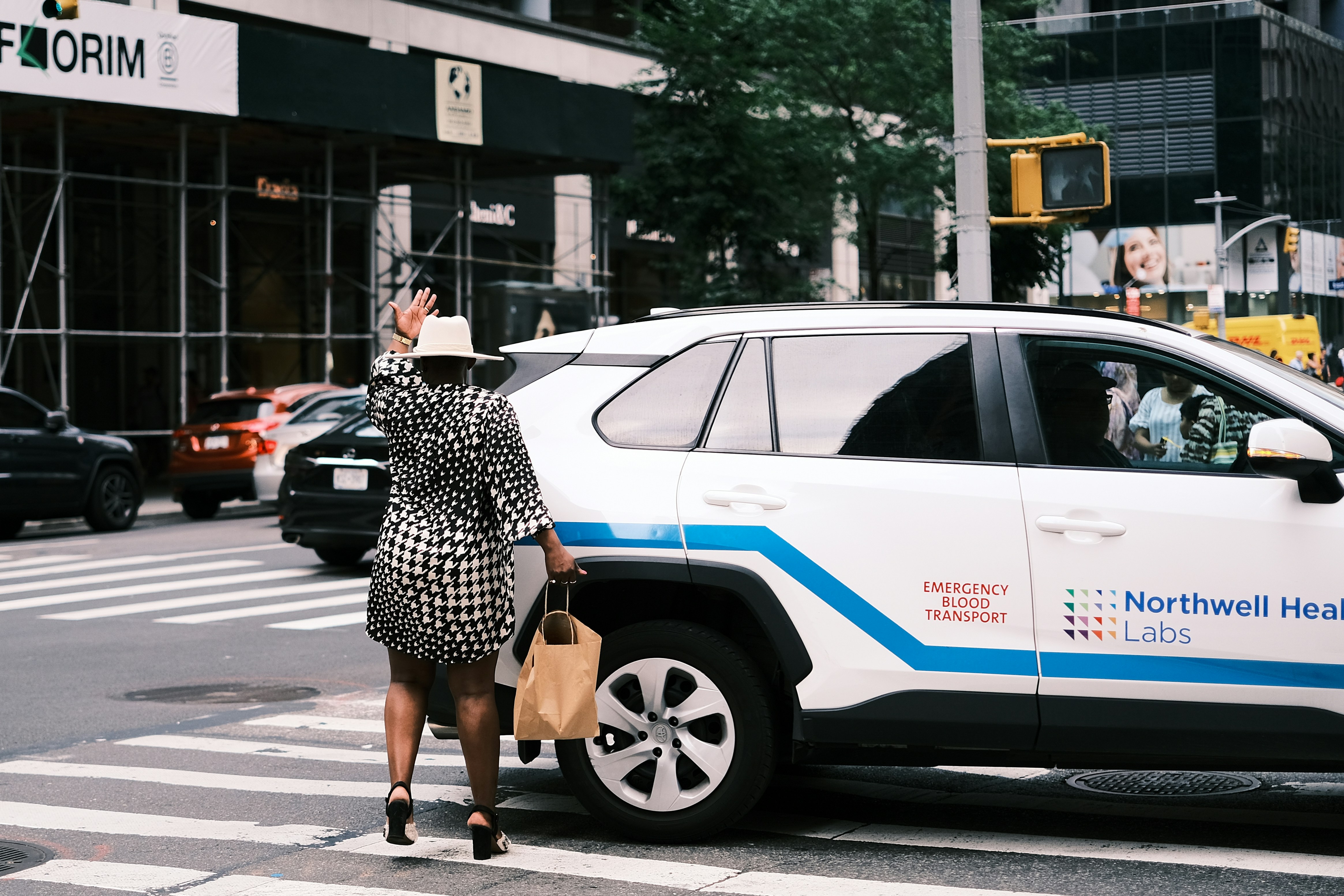 a person walking across a crosswalk