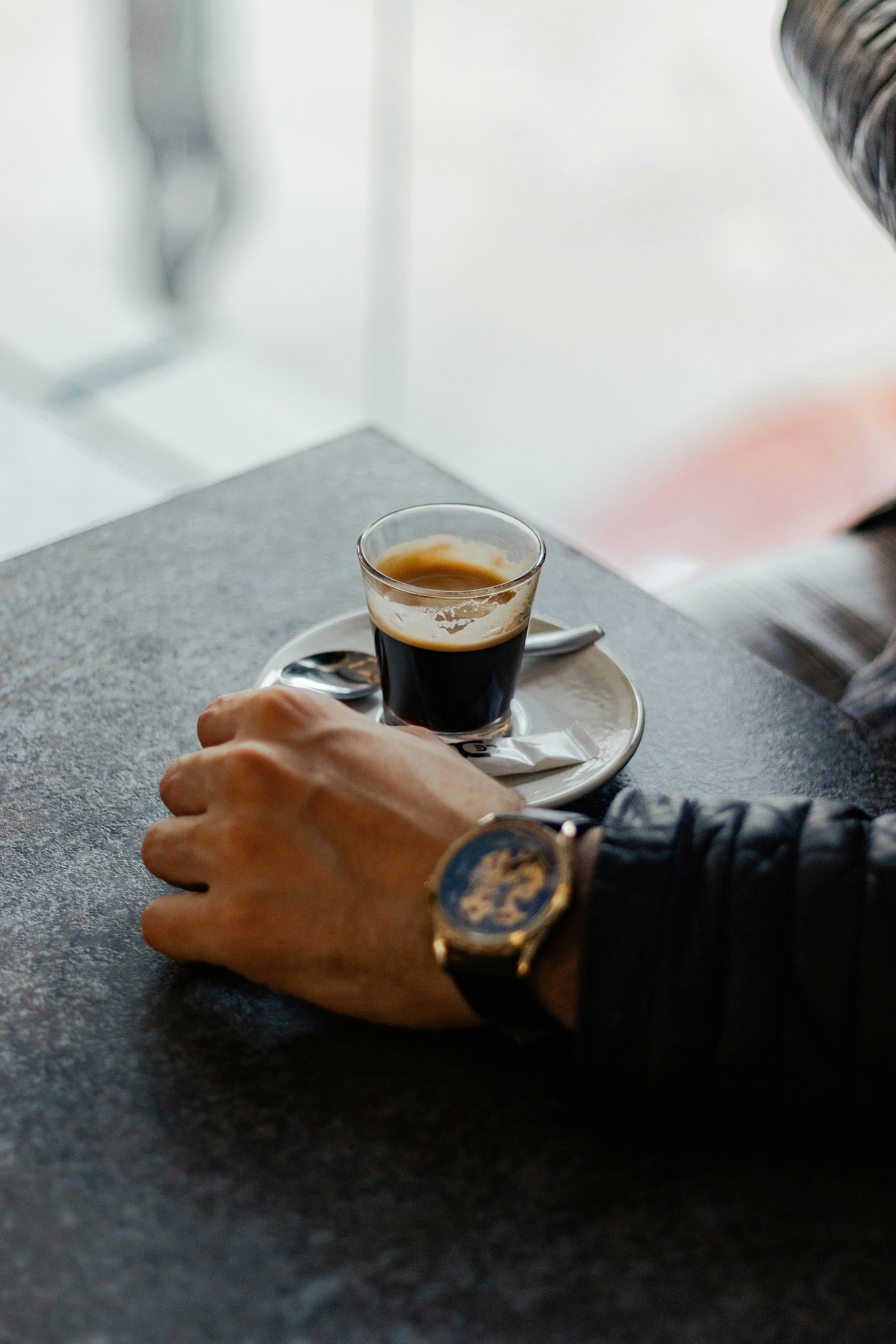 Edge of a Moment: Espresso, Leather, and Quiet Focus