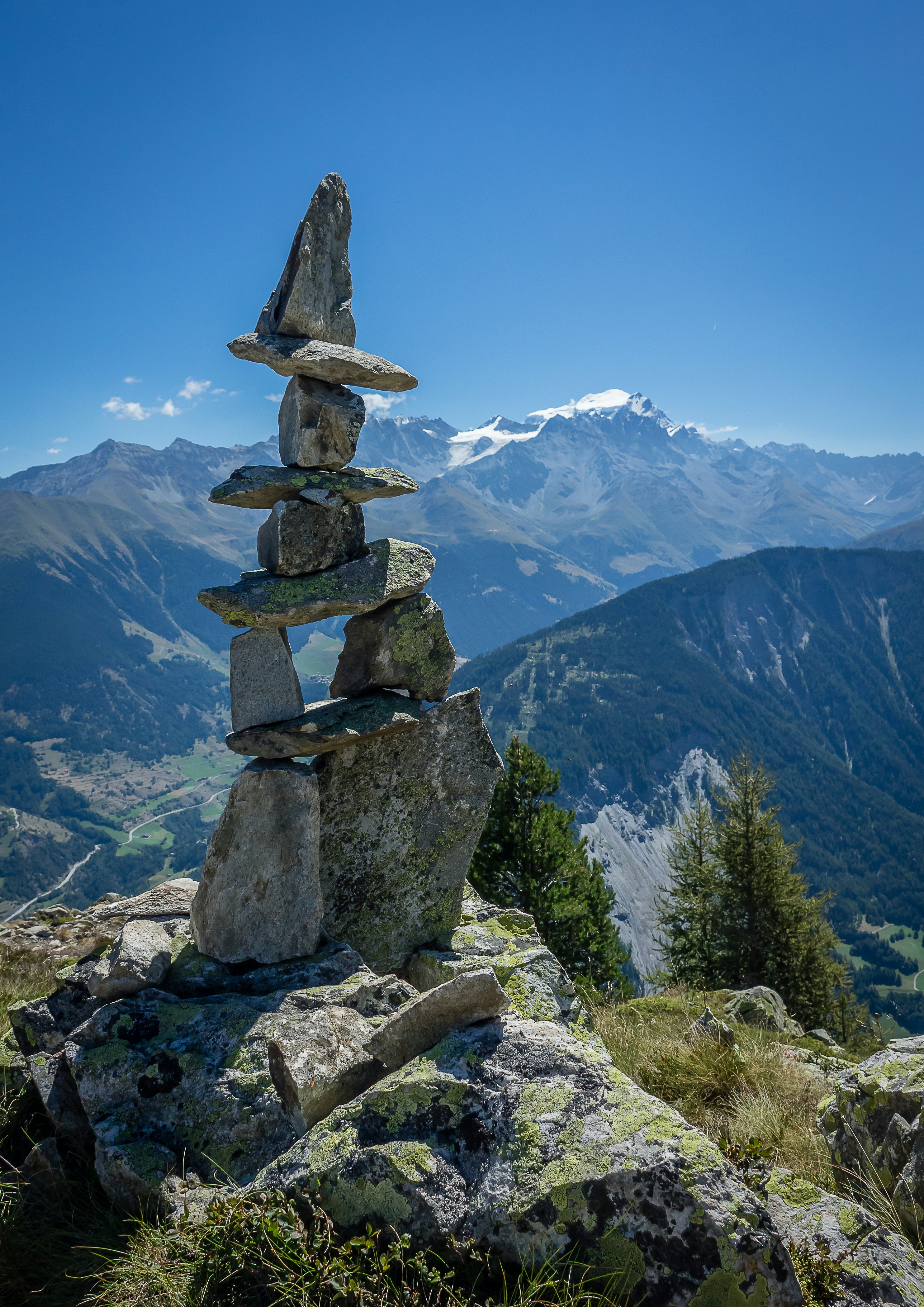 A stack of rocks on a mountain photo – Free Switzerland Image on Unsplash