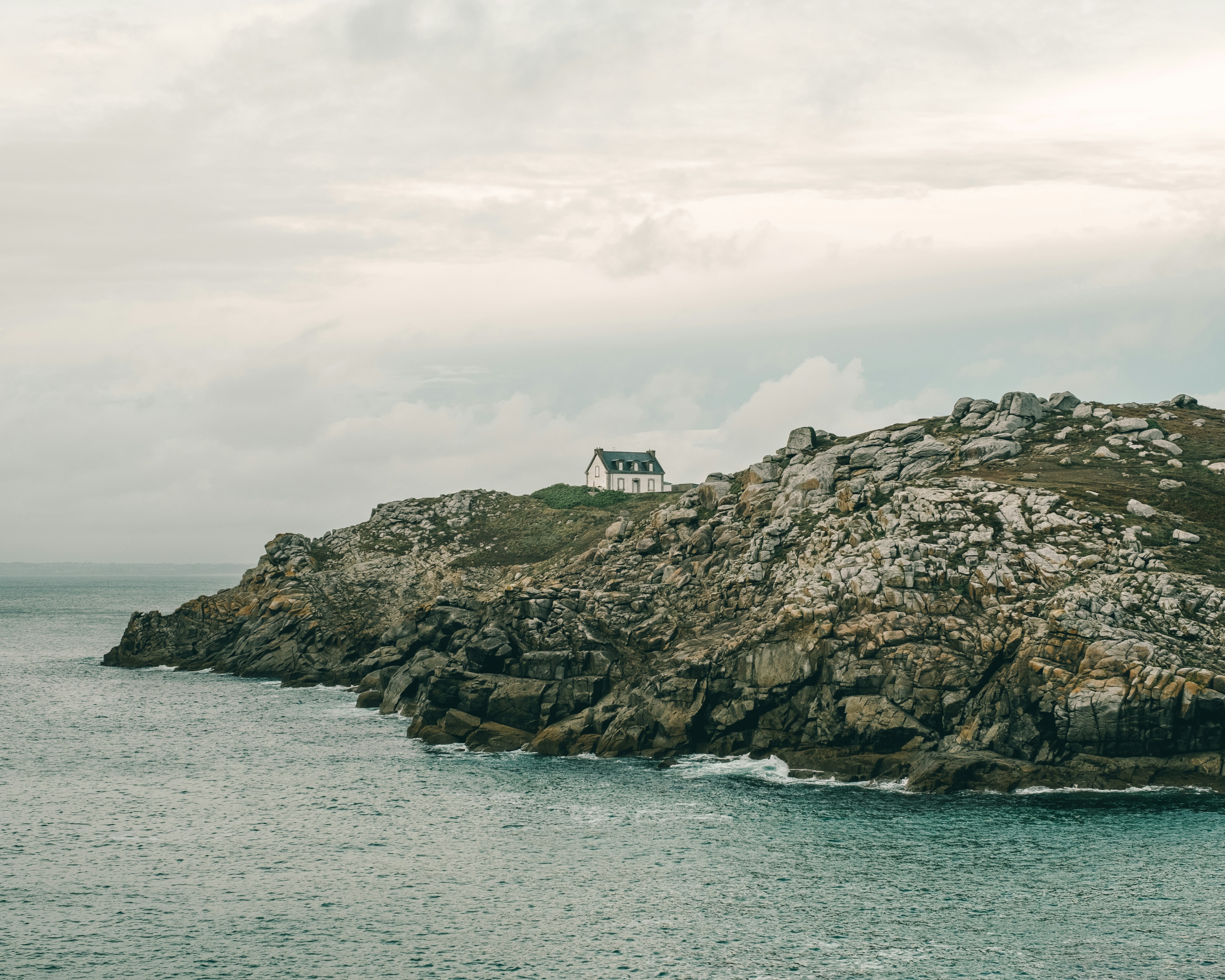 A house on a rocky island photo – Free France Image on Unsplash
