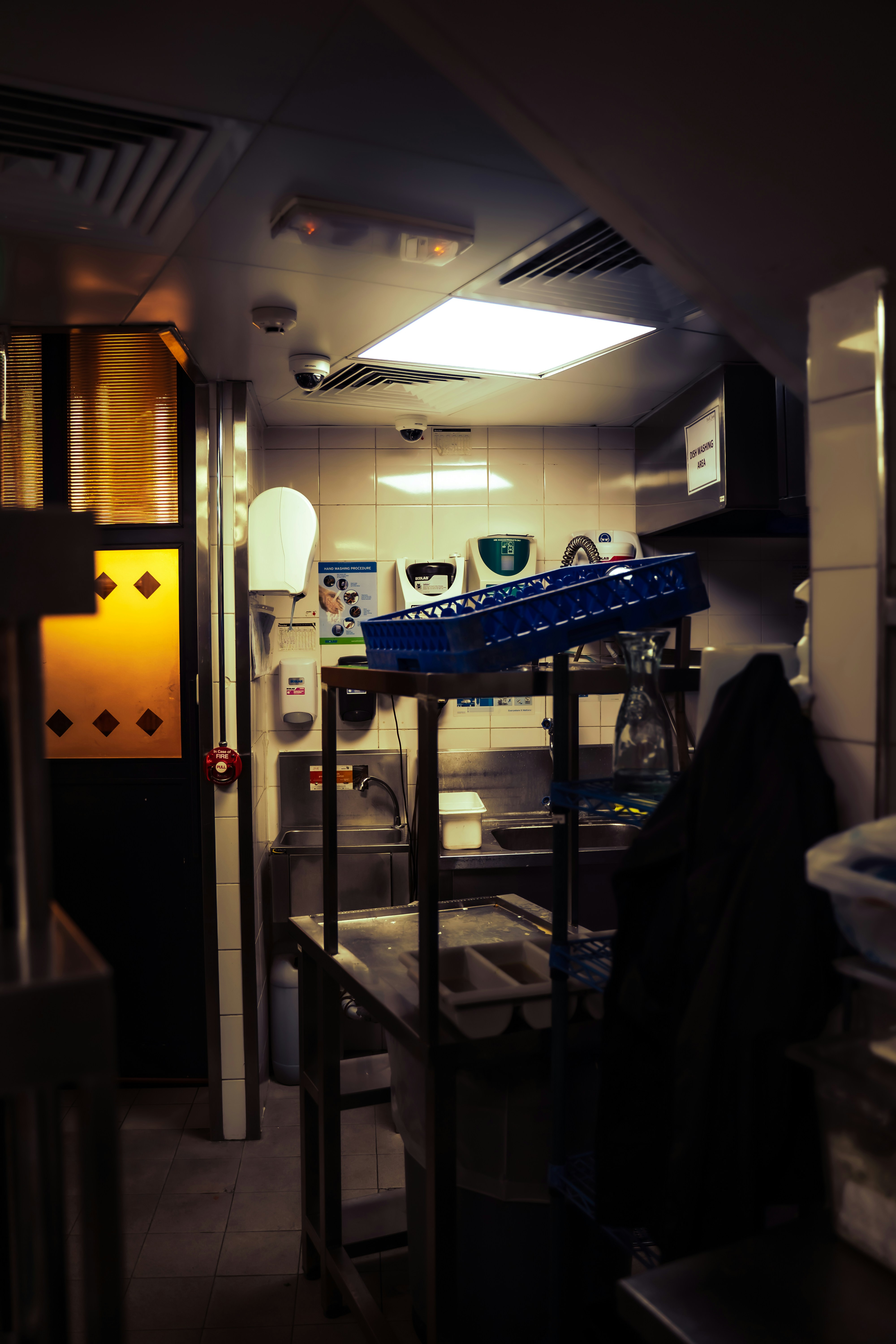 A kitchen with a blue tray on a metal shelf photo – Free Dubai Image on ...