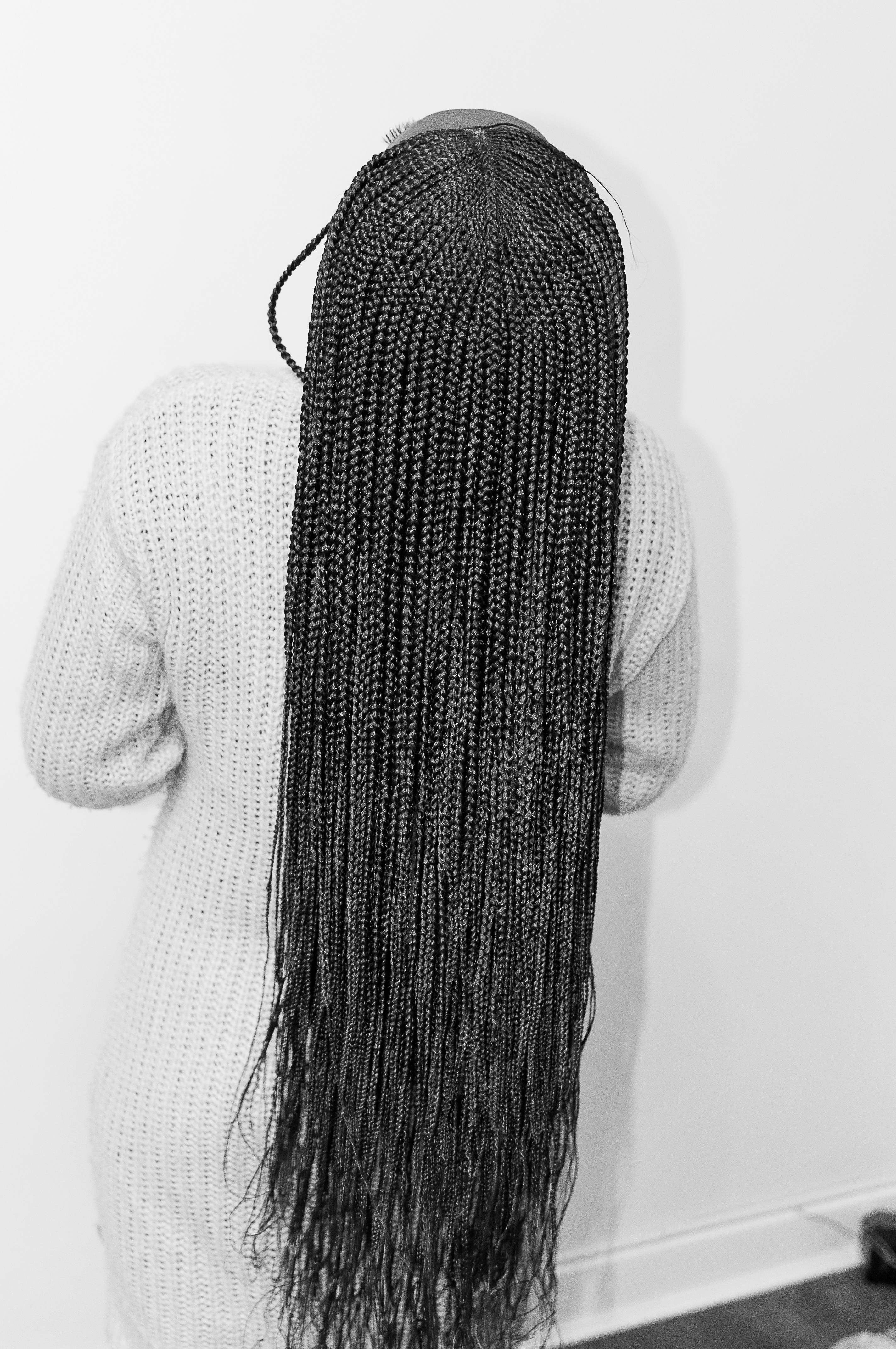 Long Braids Extensions | a person wearing a white robe