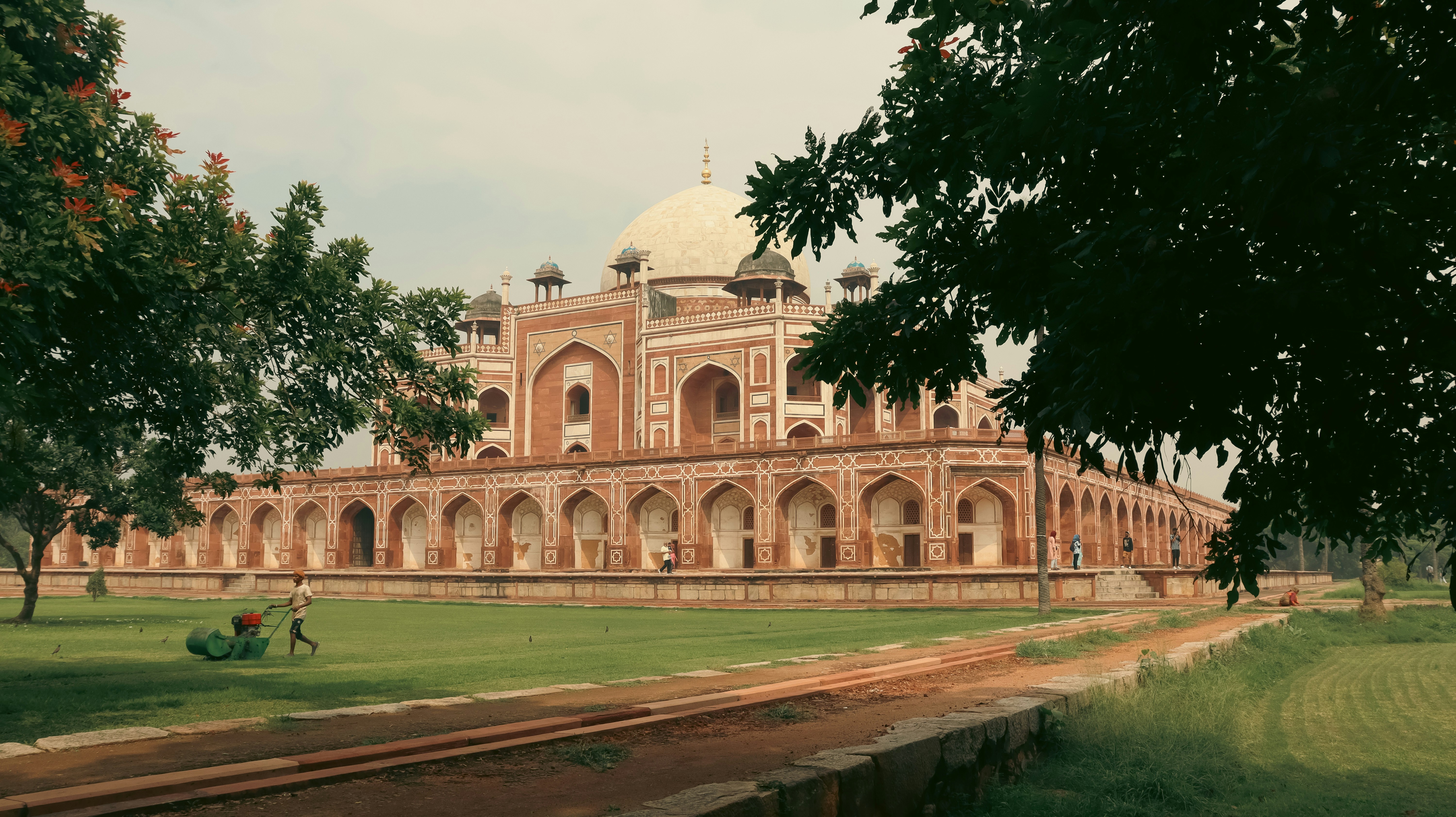 A large building with a dome and trees in front of it with Humayun's ...