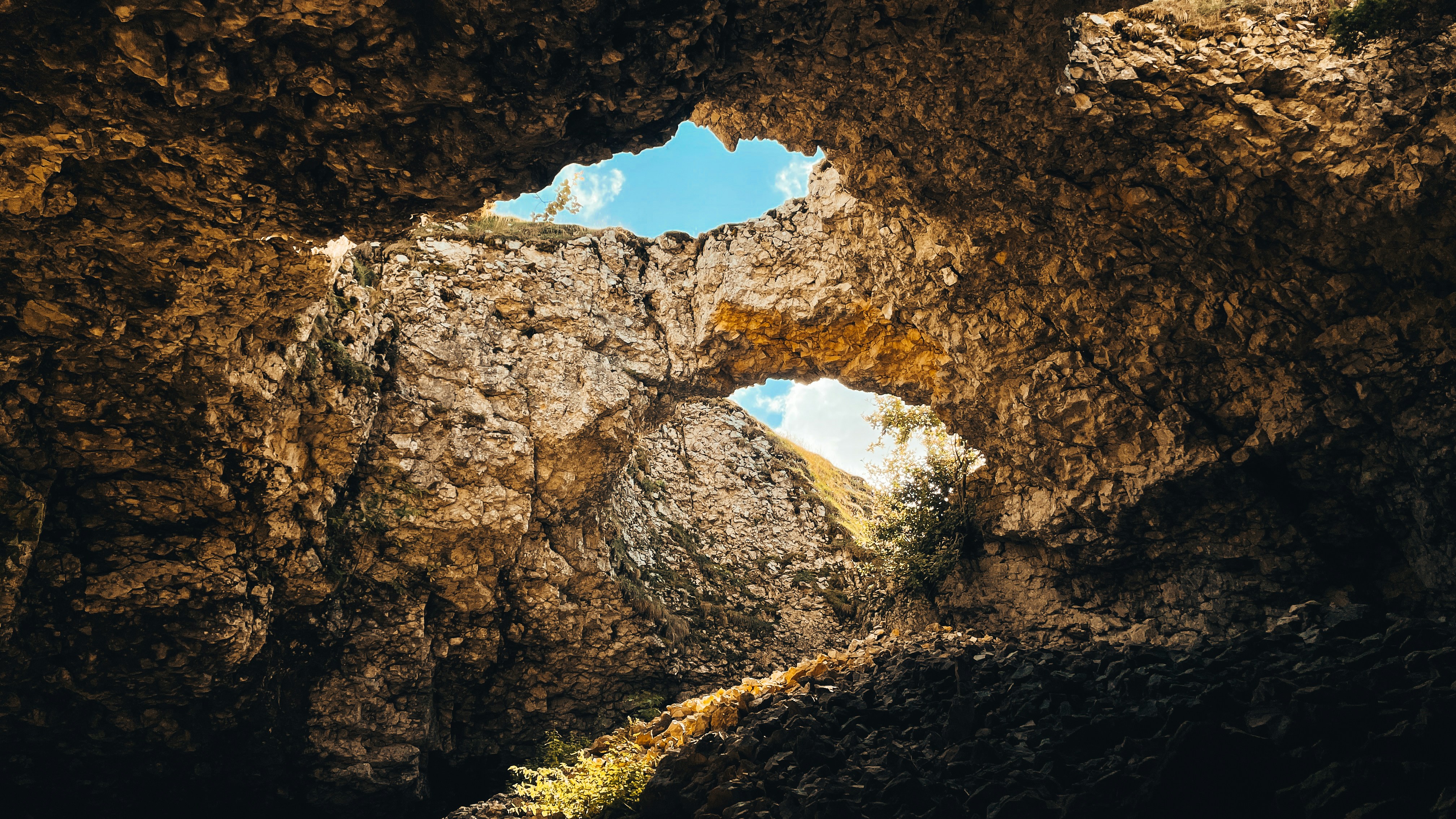 A cave with a hole in it photo – Free Plateau d'ambel Image on Unsplash