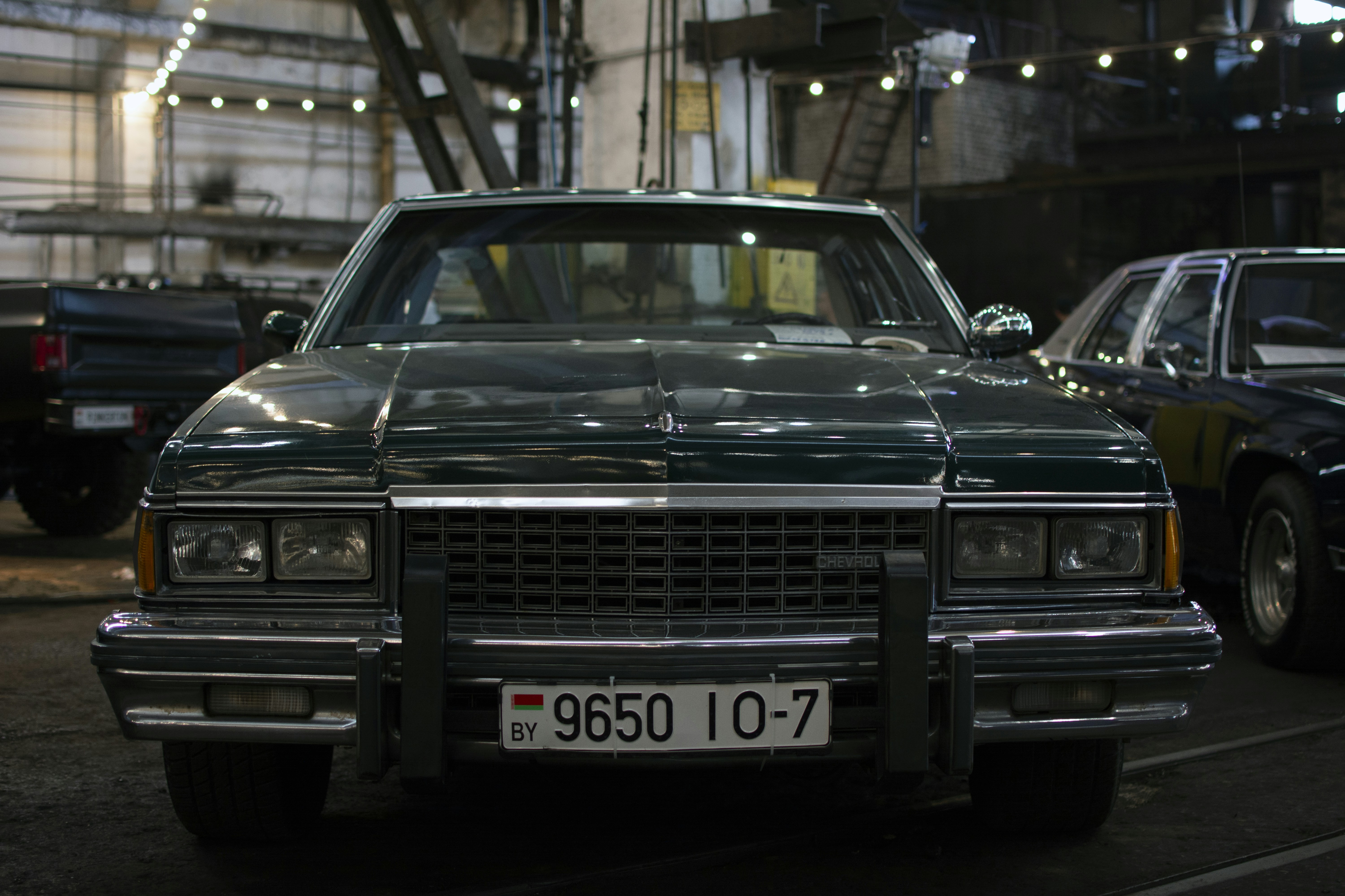 Midnight Stall: Belarusian Cruiser in a Dim Warehouse