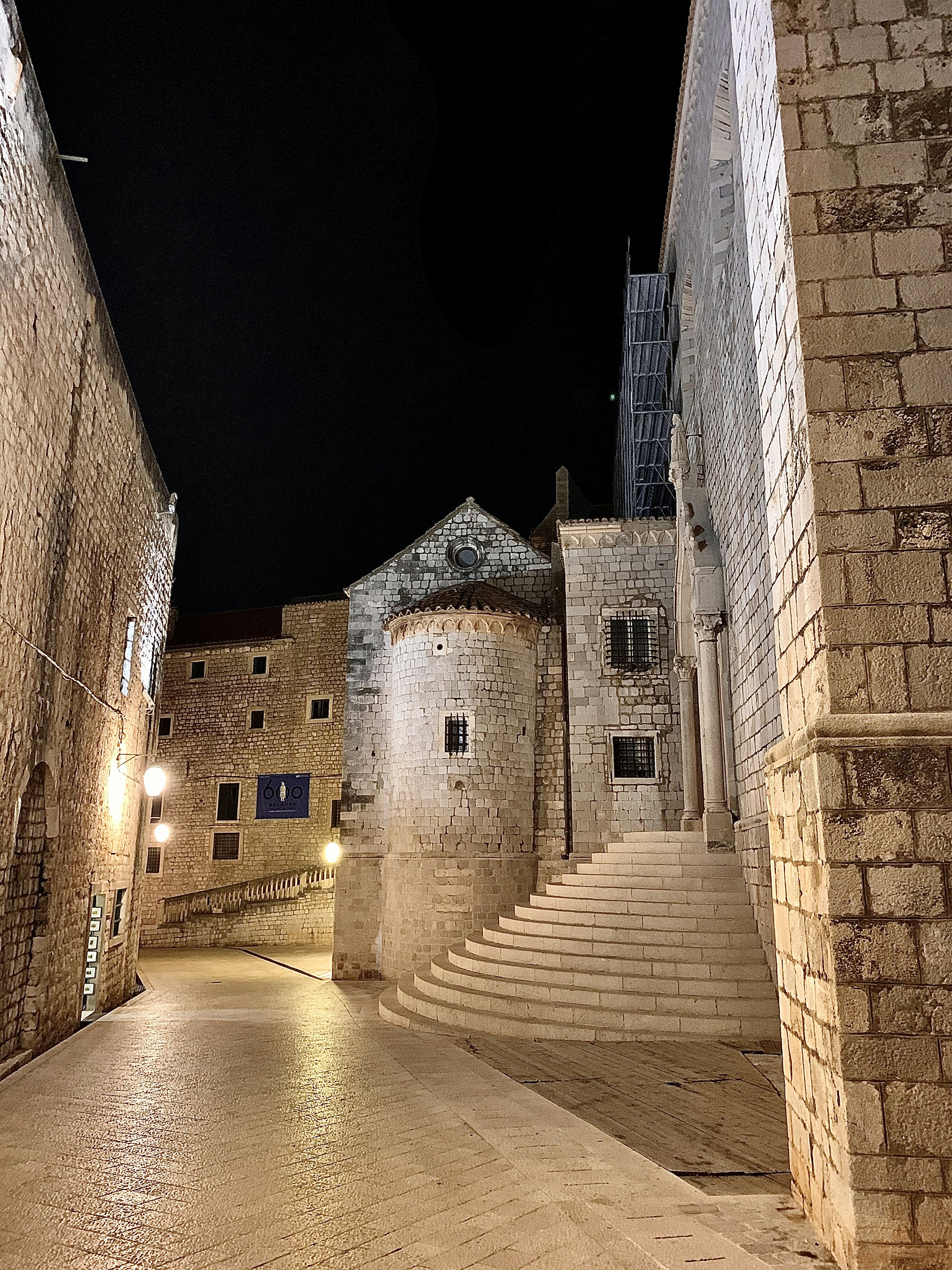 A stone walkway between two stone buildings photo – Free Dubrovnik ...