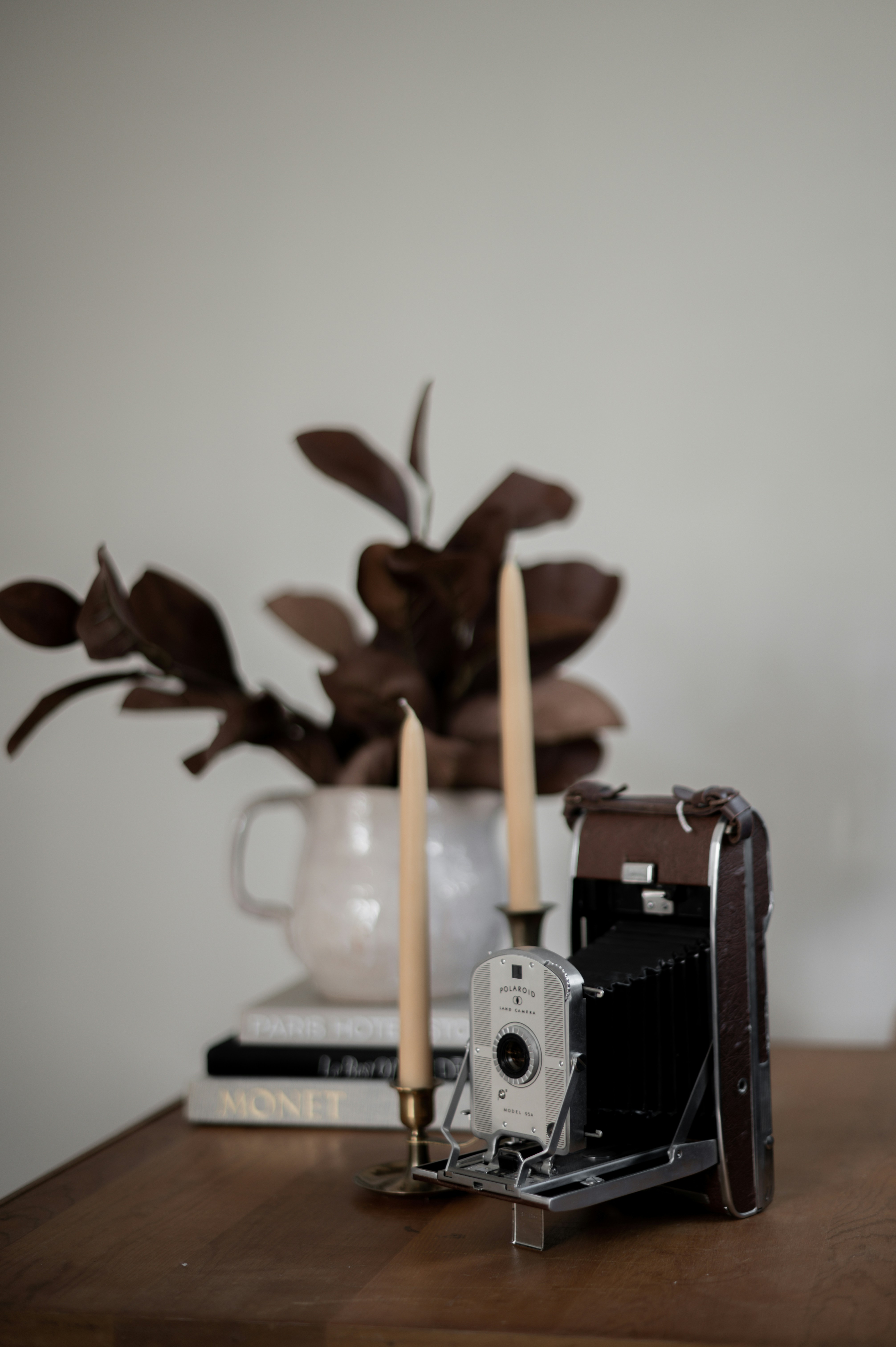 A candle on a camera photo – Free Grey Image on Unsplash