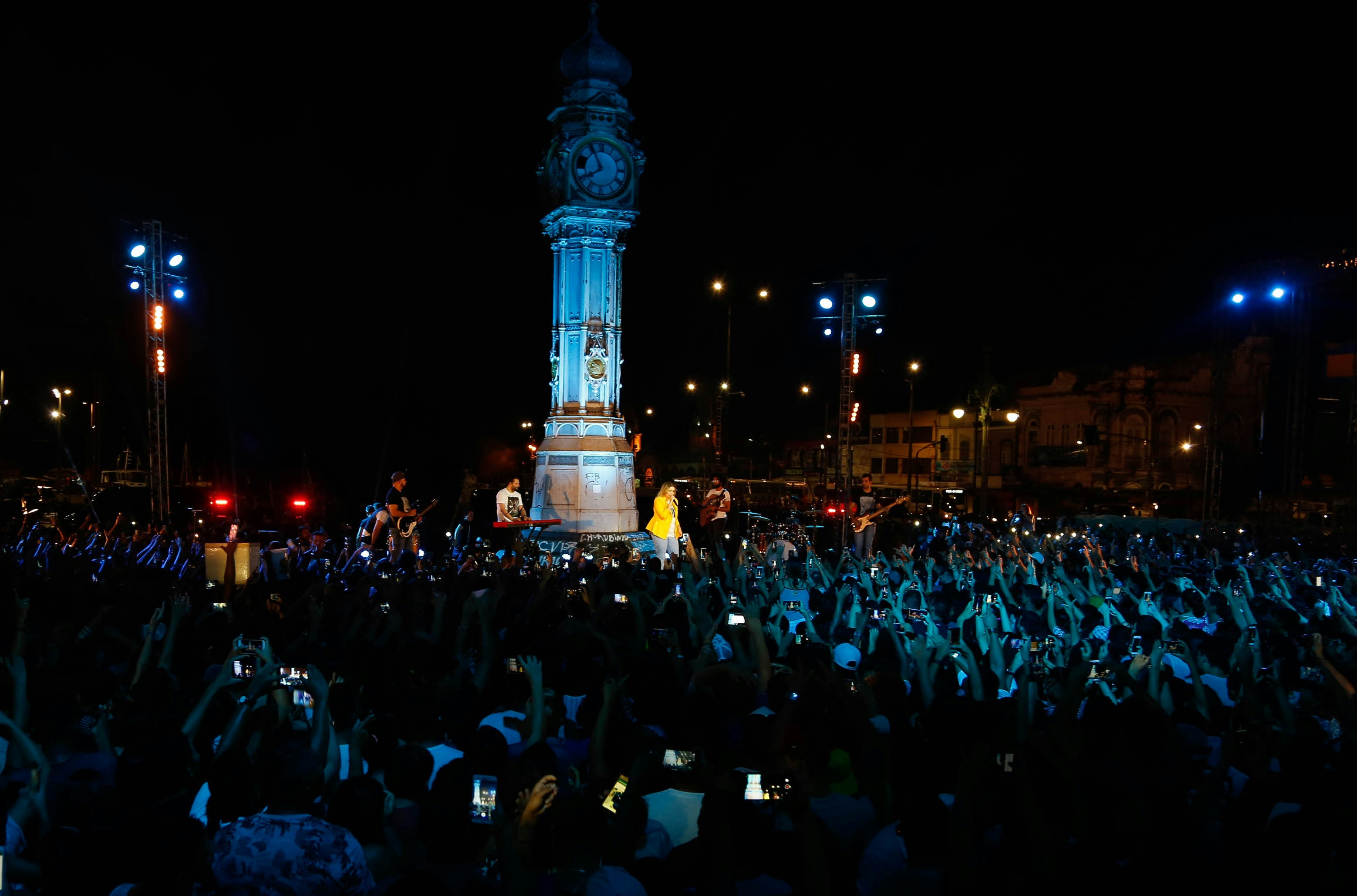 Nighttime Symphony of Lights and People