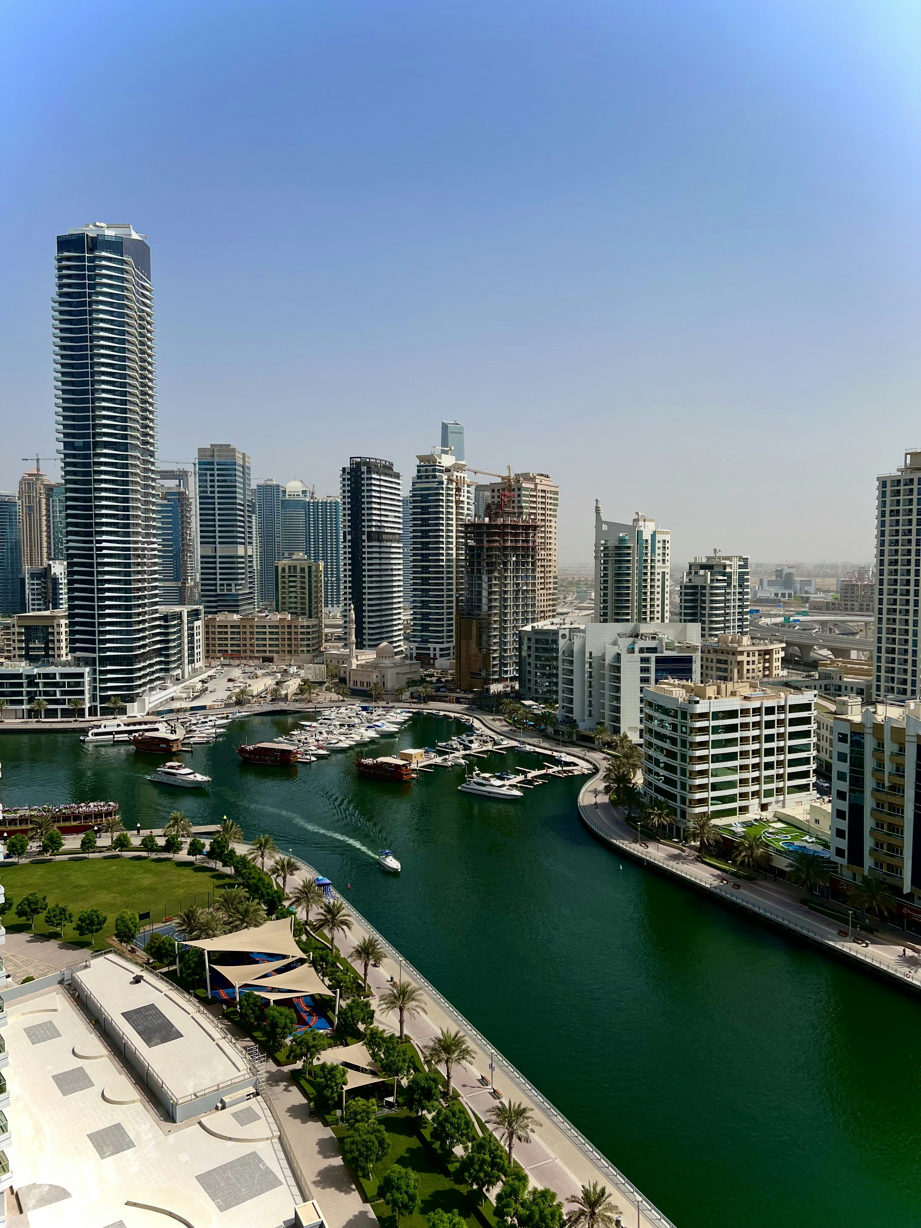Woven Waterfront: Marina Skyline Bends Around a Quiet Canal