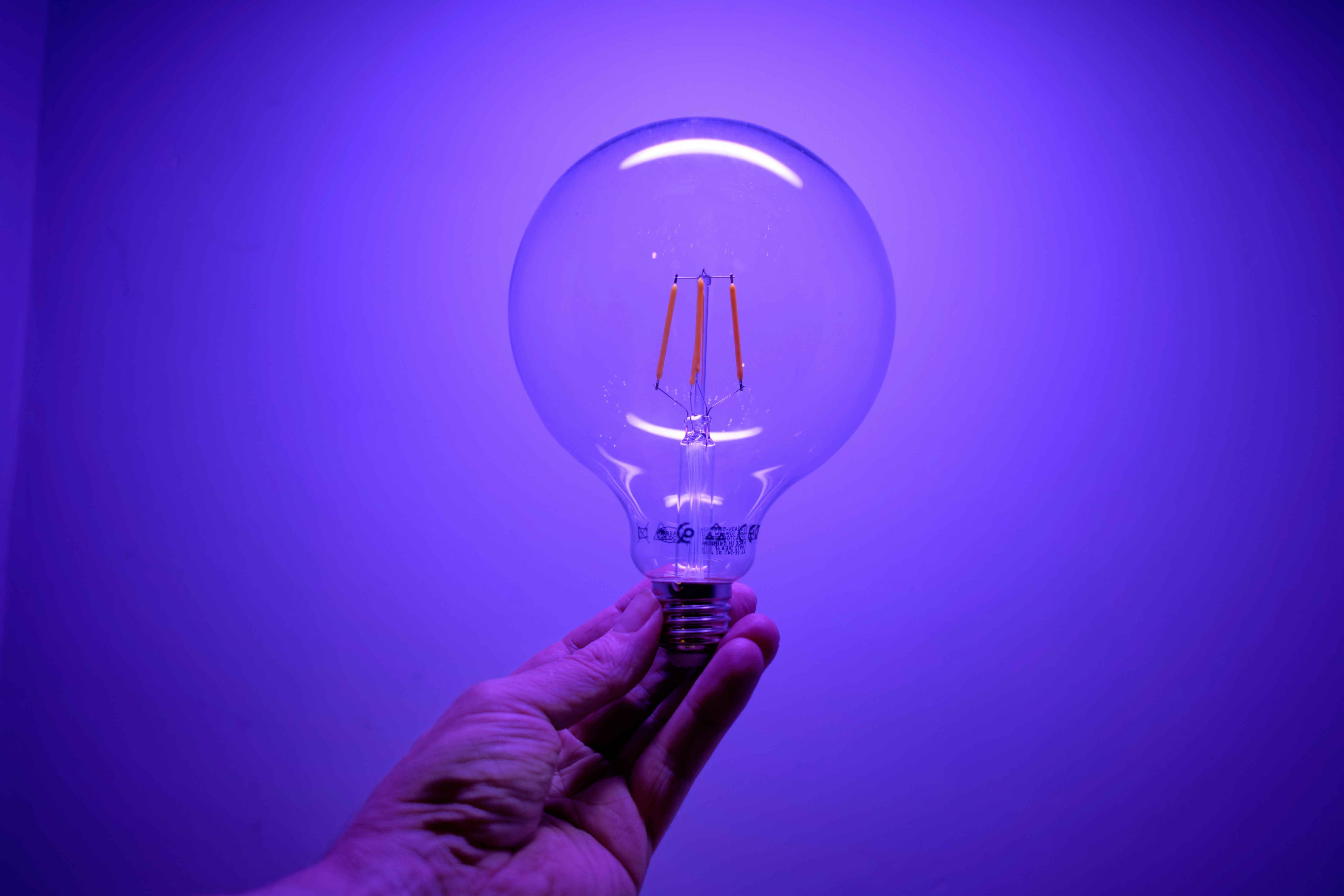 Just a few shots of me holding a lightbulb against different colour hue light backgrounds.