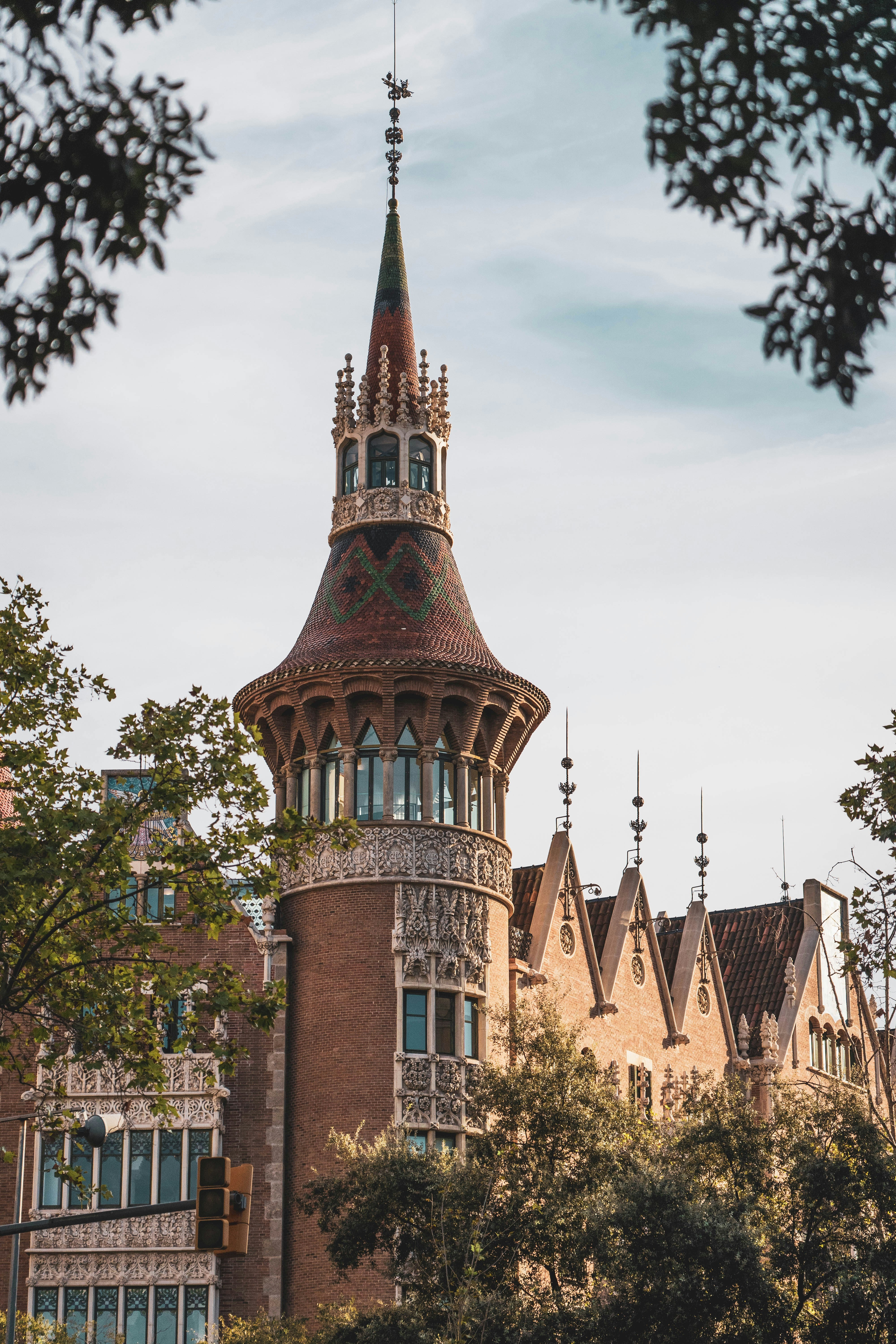 A tall building with a pointy tower photo – Free Barcelona Image on ...
