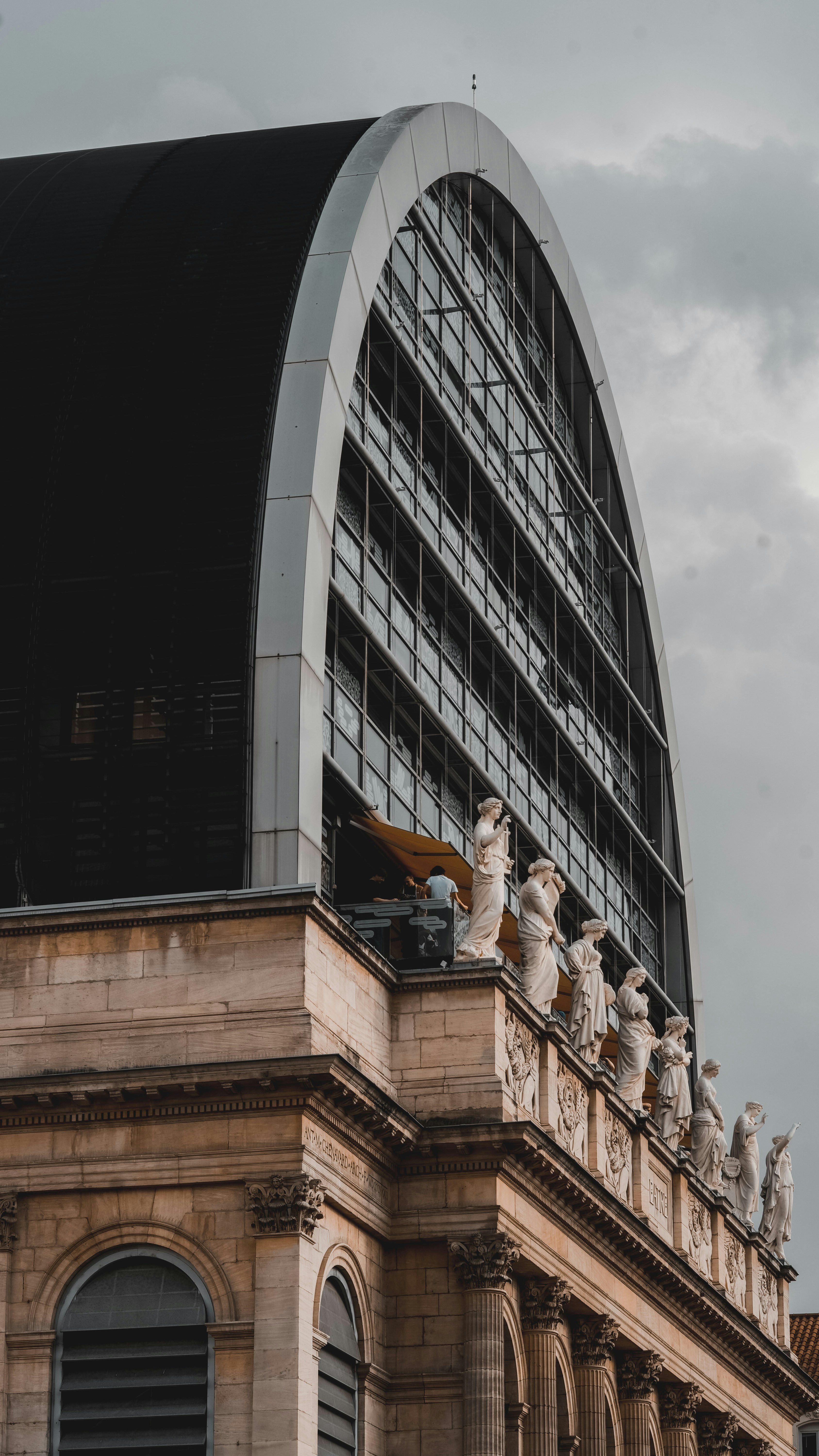 Stone Sentinels Overlooking a Glass Arc
