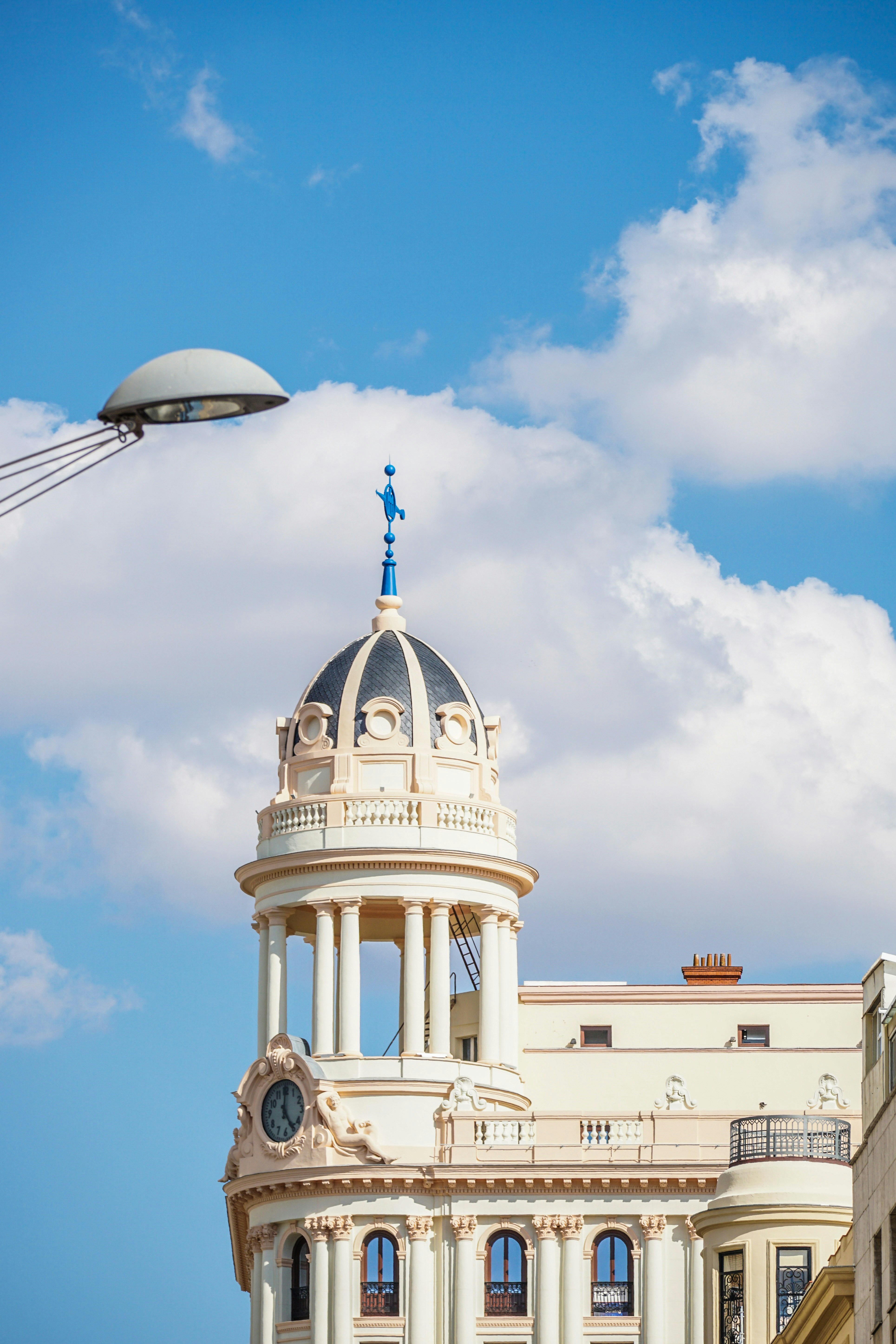 Ornate Domed Clocktower Reaching Toward a Clear Sky