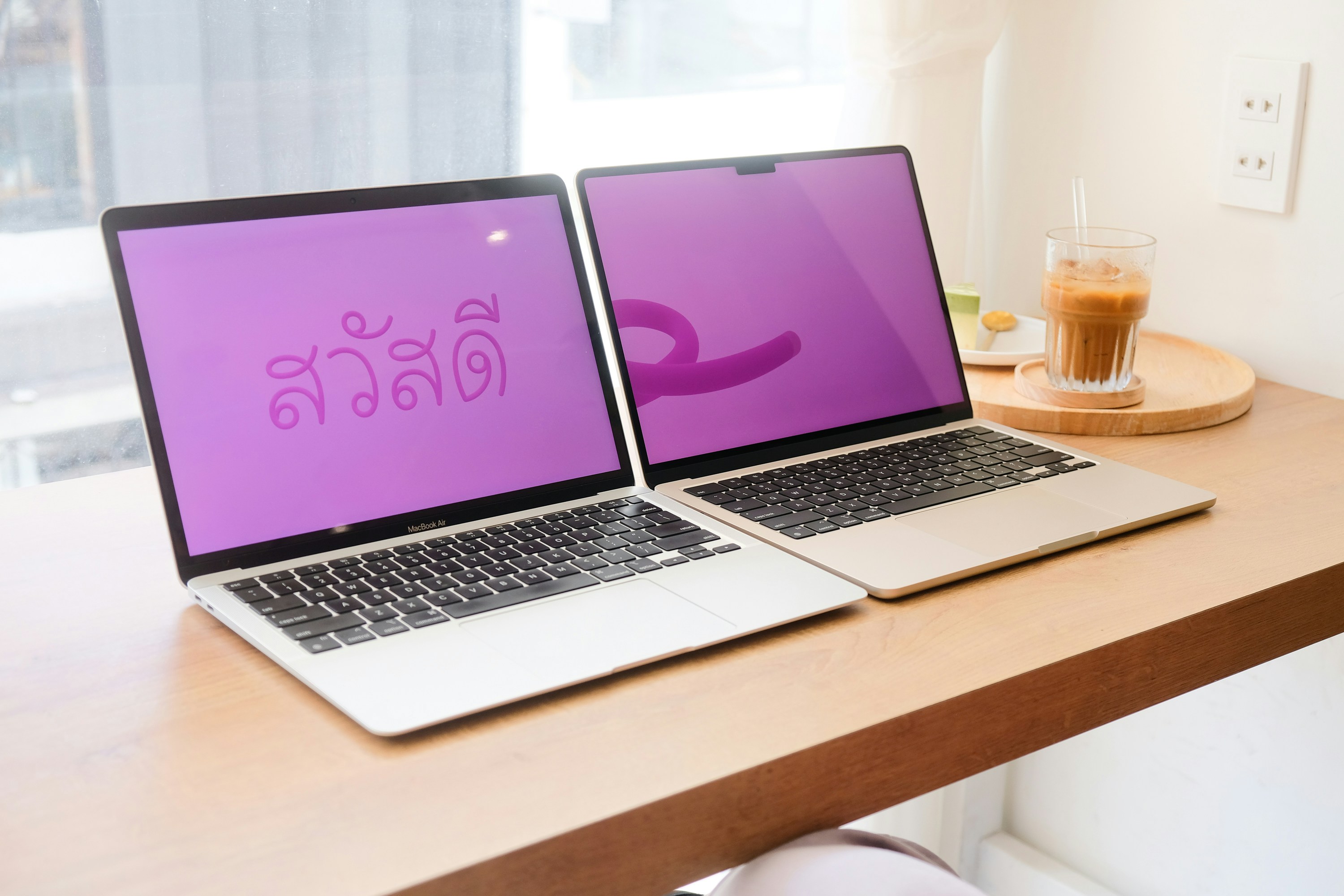 A couple of laptops on a table photo – Free Ho chi minh Image on Unsplash
