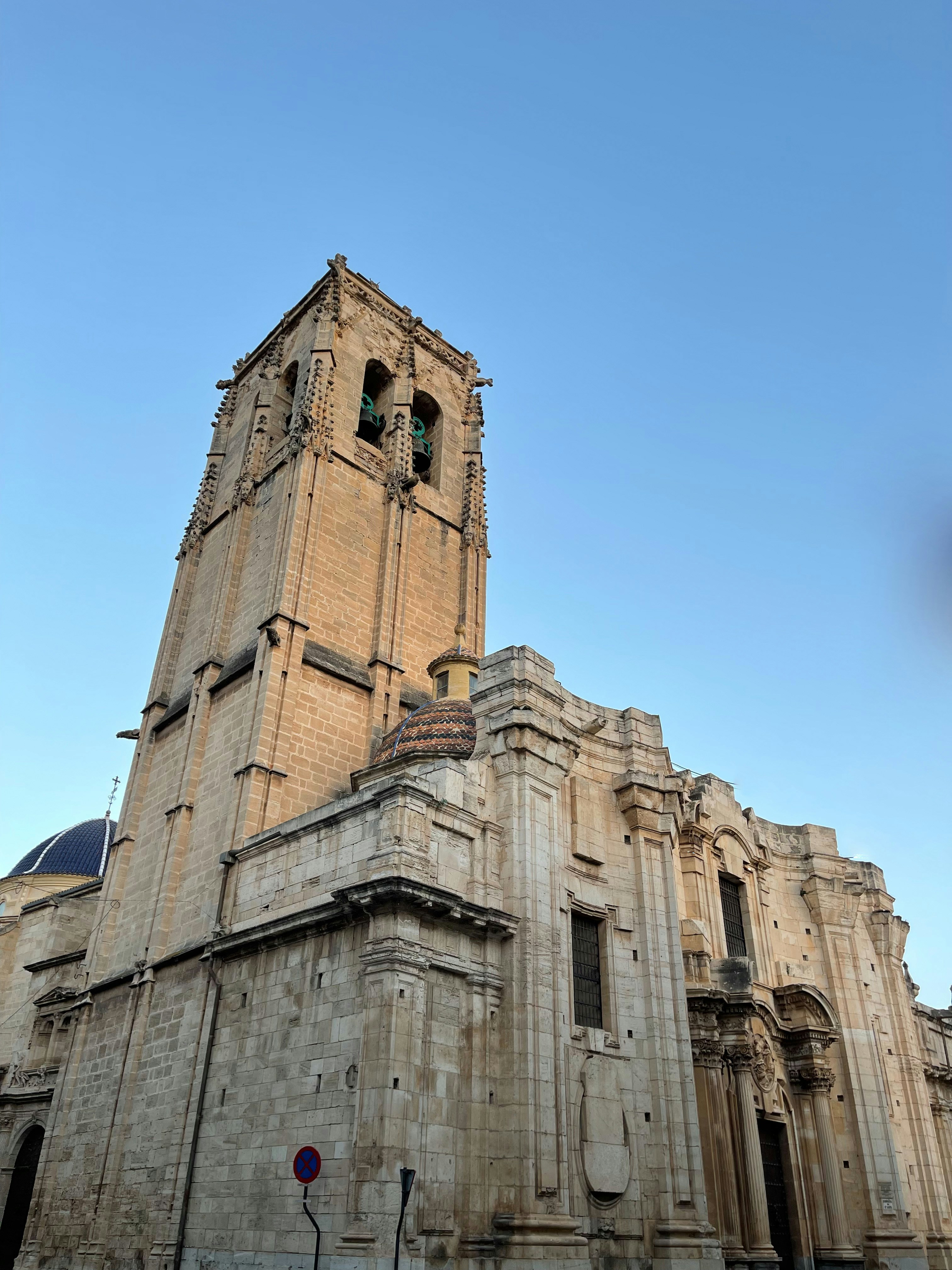 A large stone building with a tower photo – Free Spain Image on Unsplash