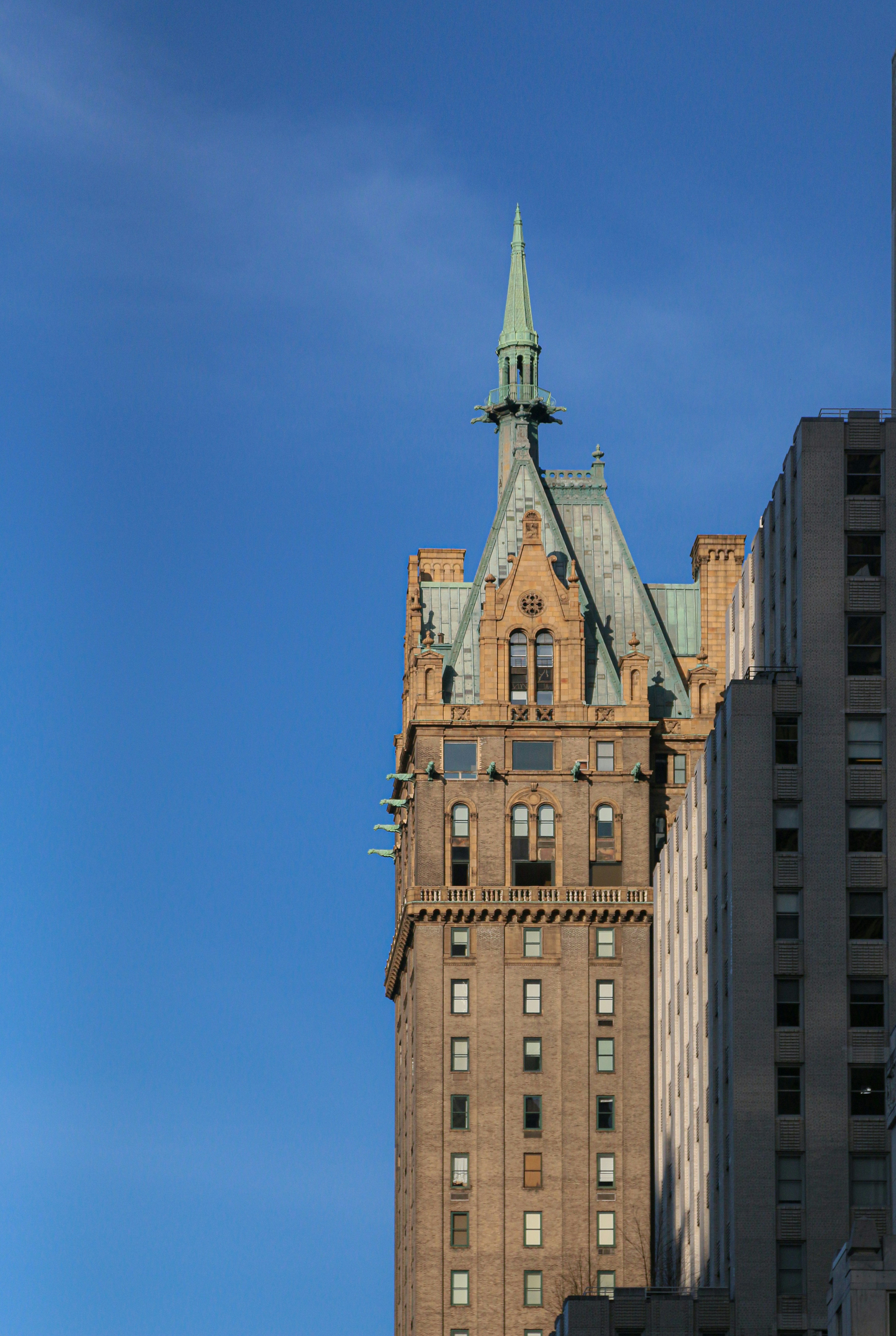 A tall building with a green steeple photo – Free Architecture Image on ...