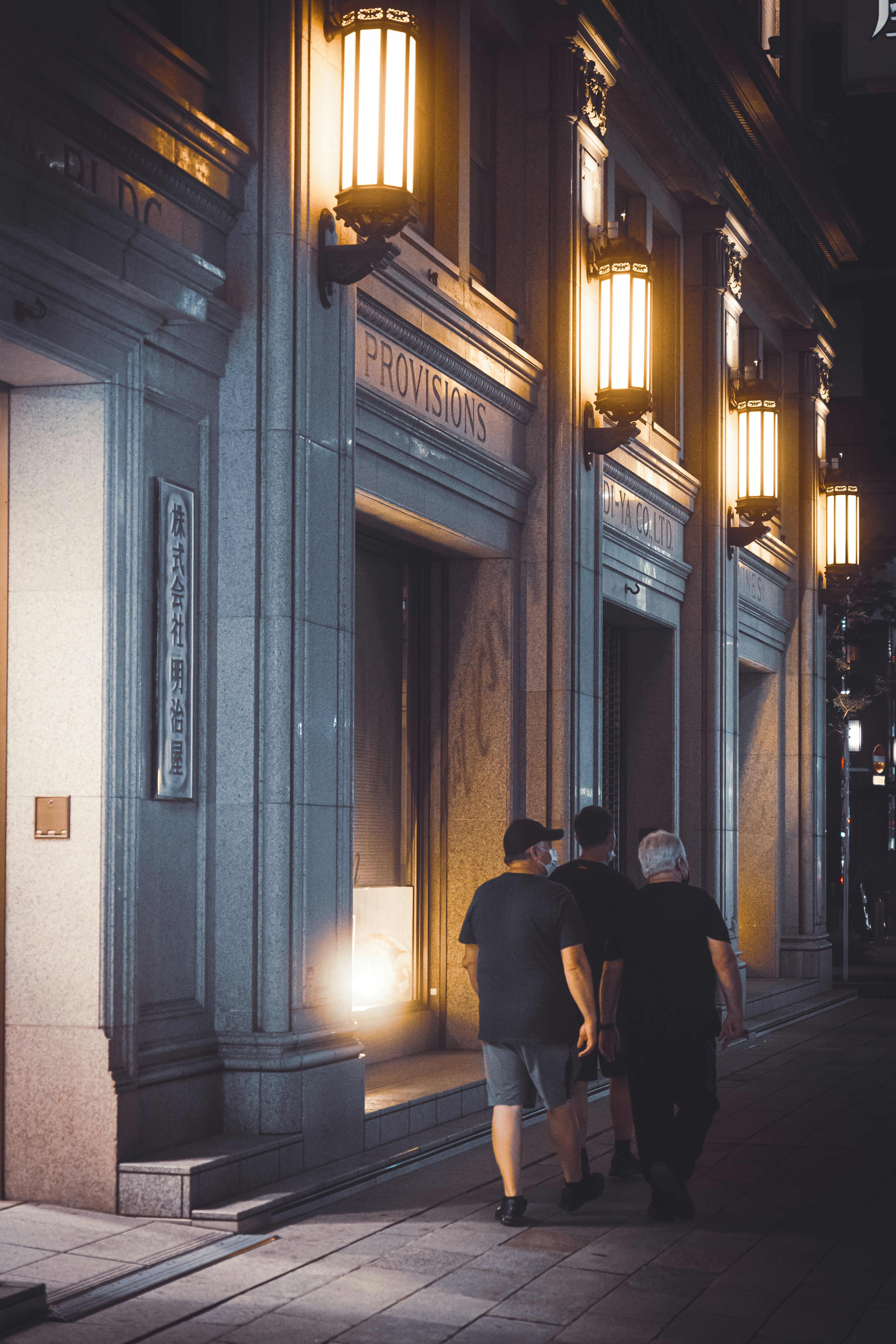 Amber Lanterns and Quiet Steps Along the Provisions Facade