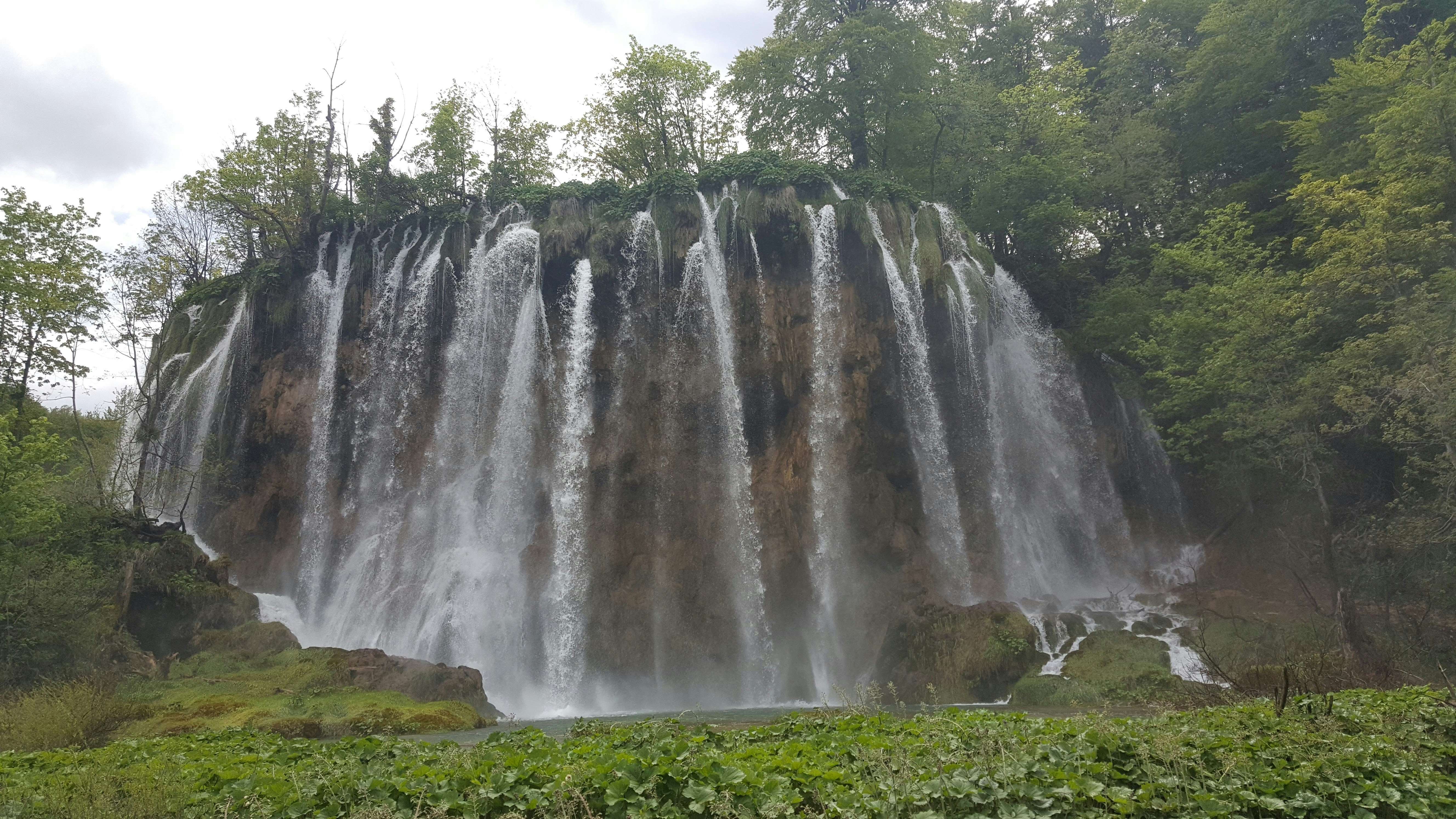 A waterfall in a forest photo – Free Croatia Image on Unsplash
