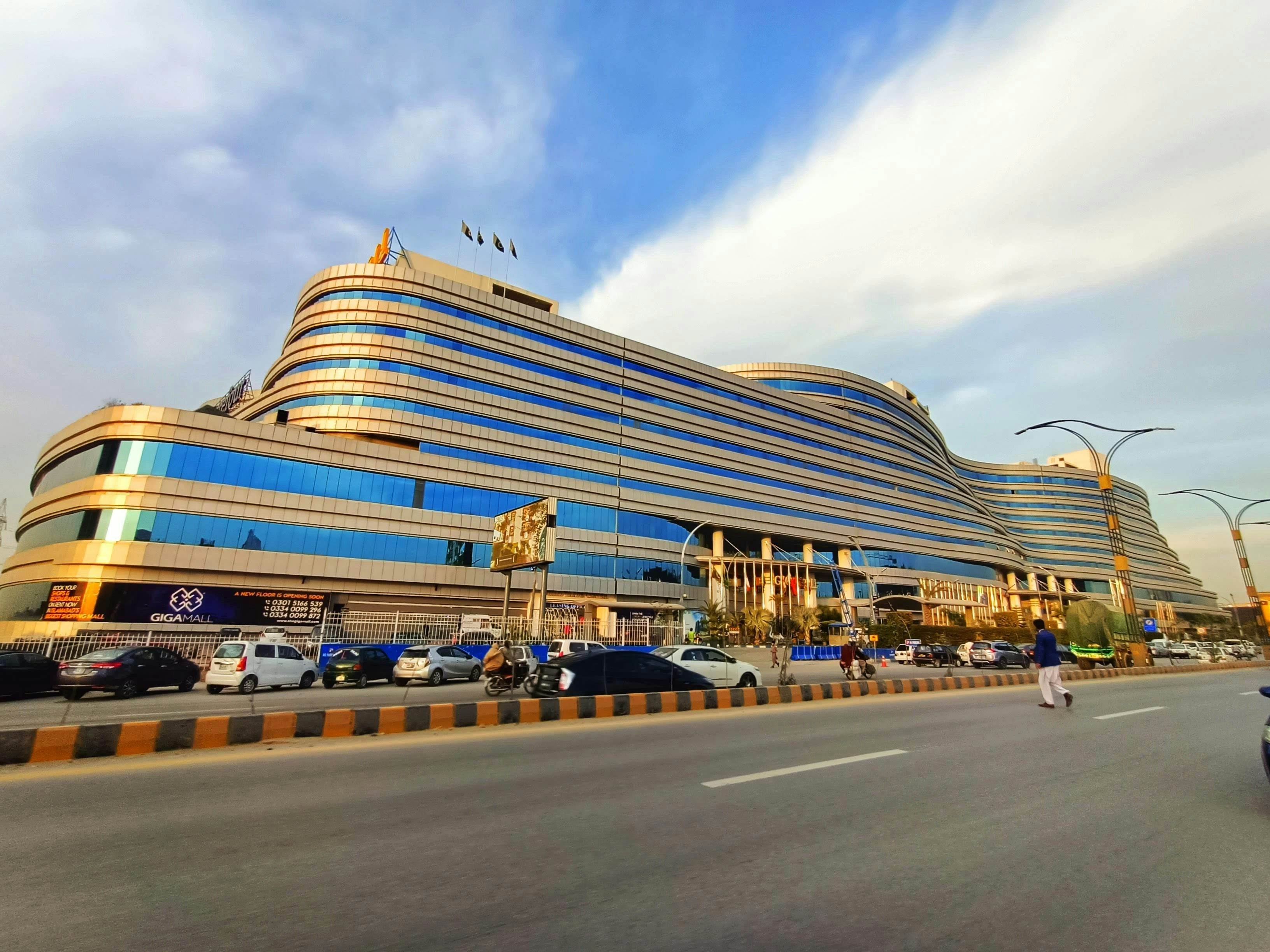 Azure Crescent: The Glassy Modernity of a Curved Corporate Complex