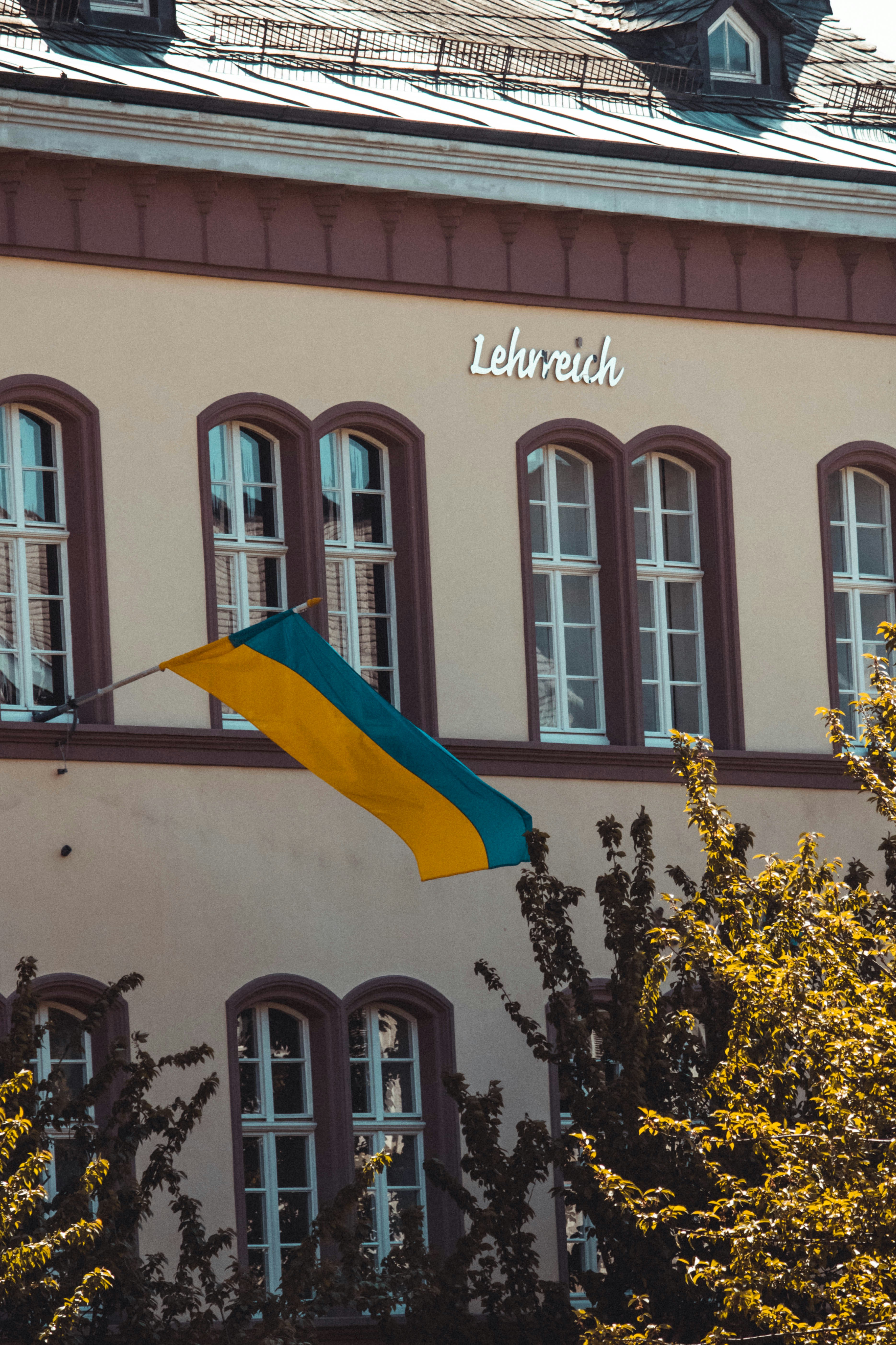 a building with a flag in front of it