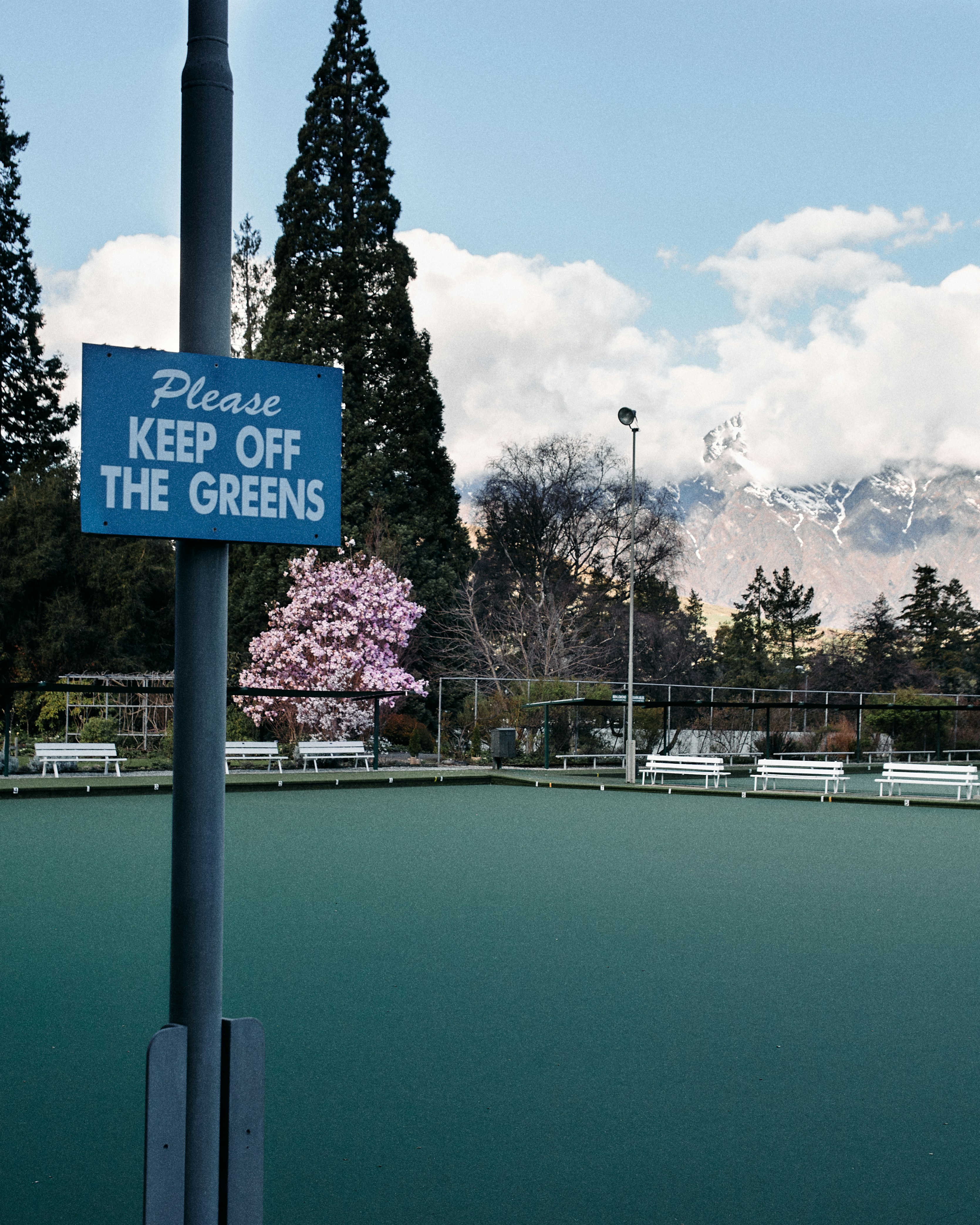 A sign on a pole photo – Free Queenstown Image on Unsplash
