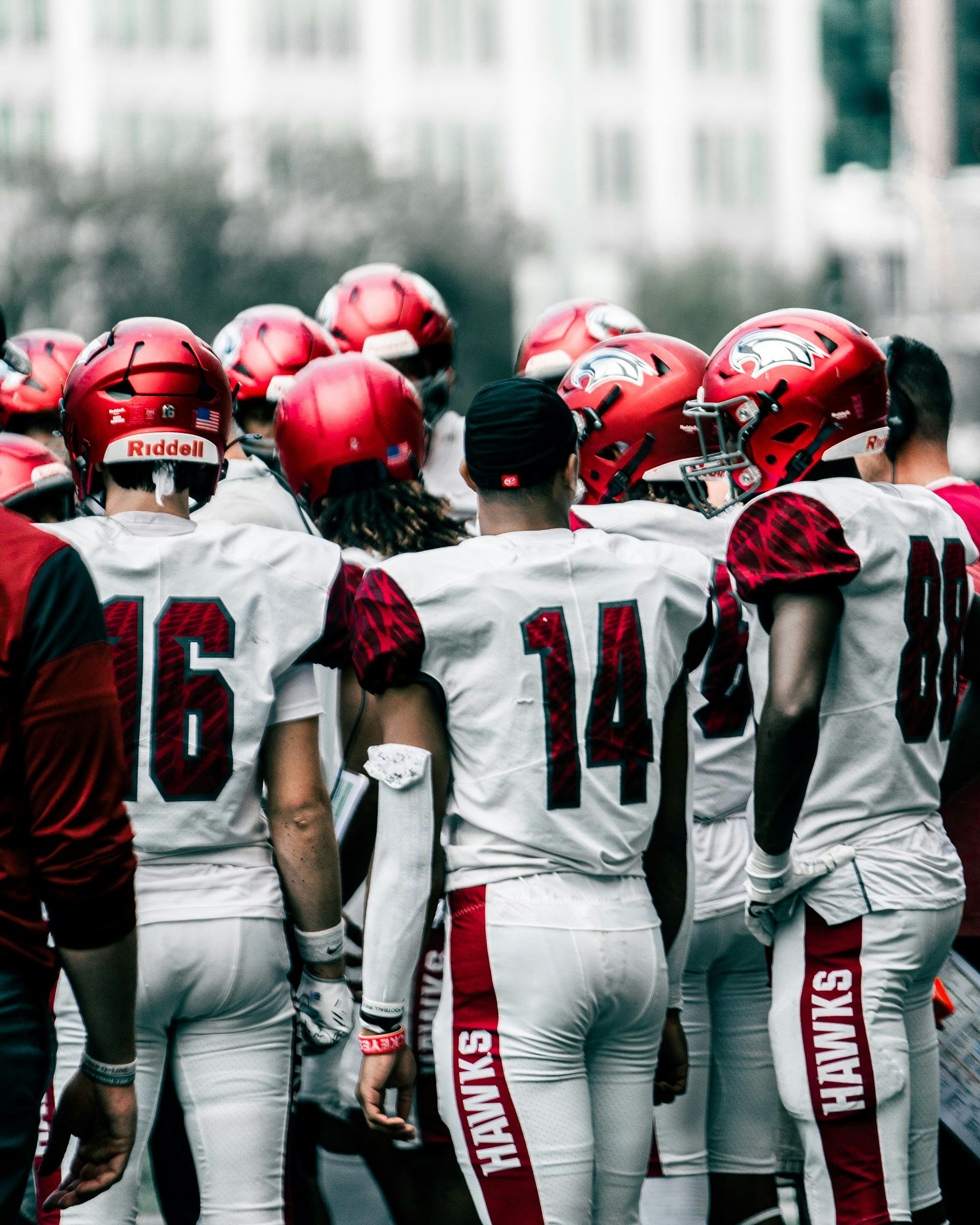 Gathered Gridiron: A Huddle of Red-Helm Warriors