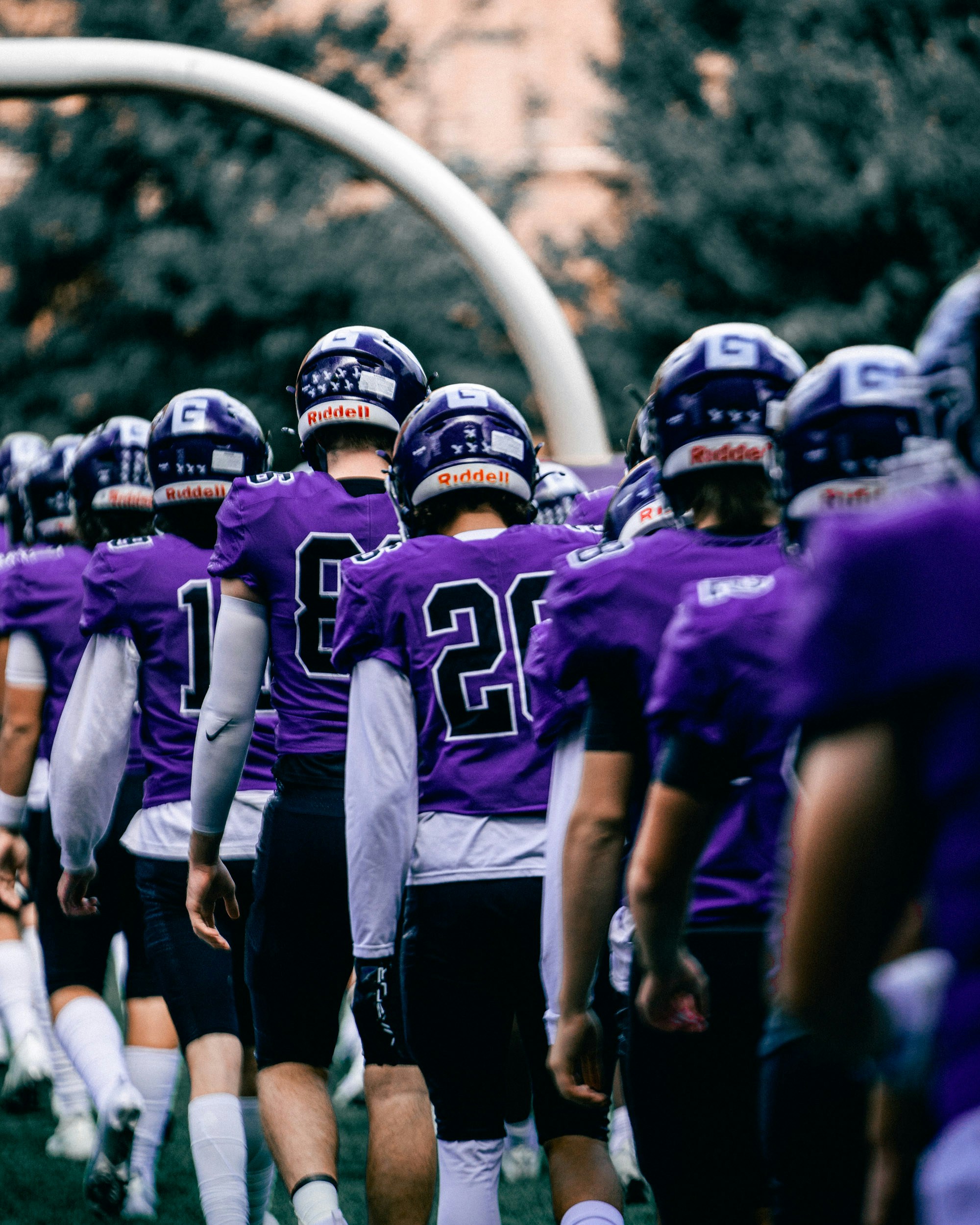 A group of people wearing football gear photo – Free Football Image on ...