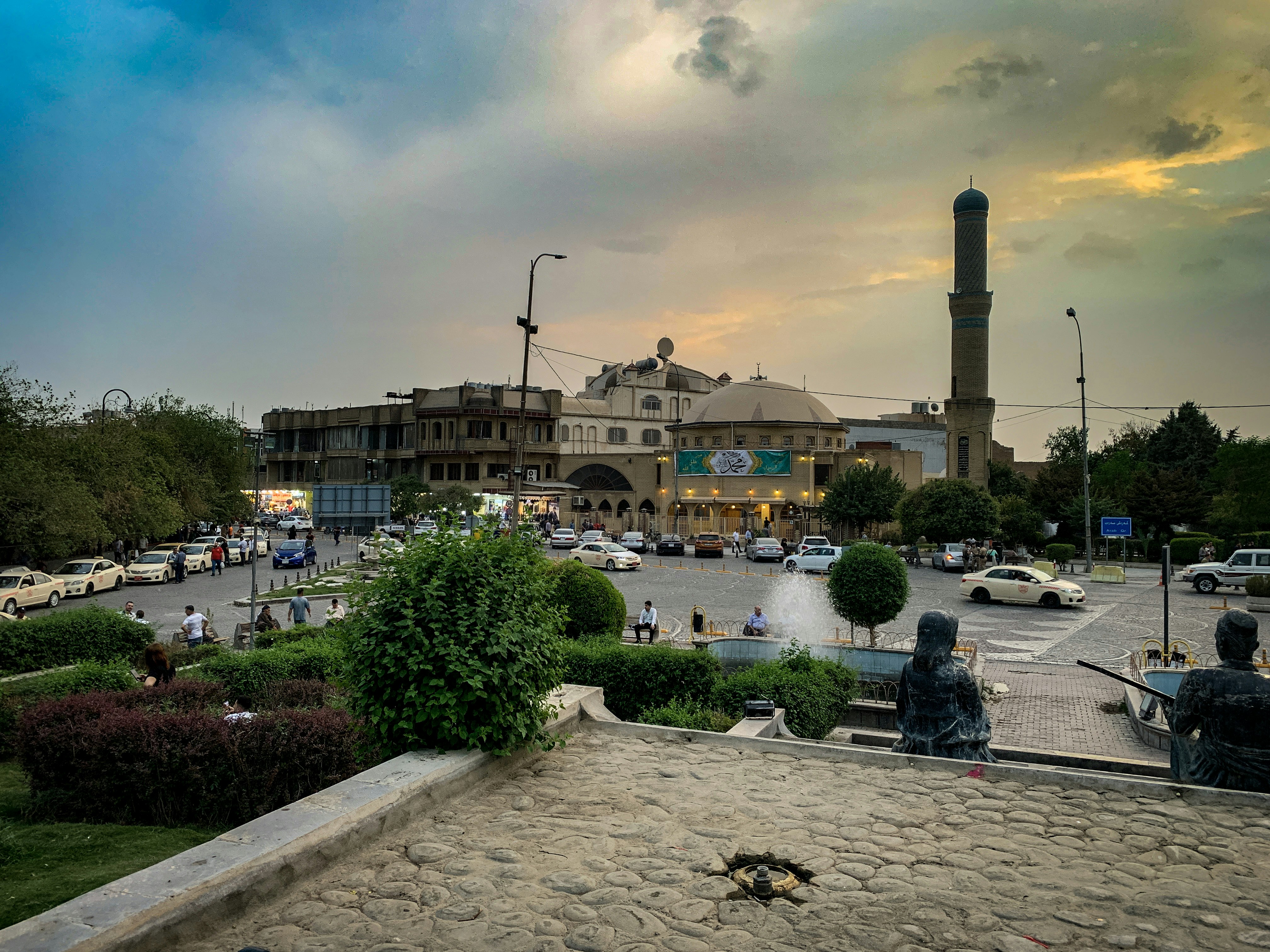 A large building with a fountain in front of it photo – Free Iraq Image ...