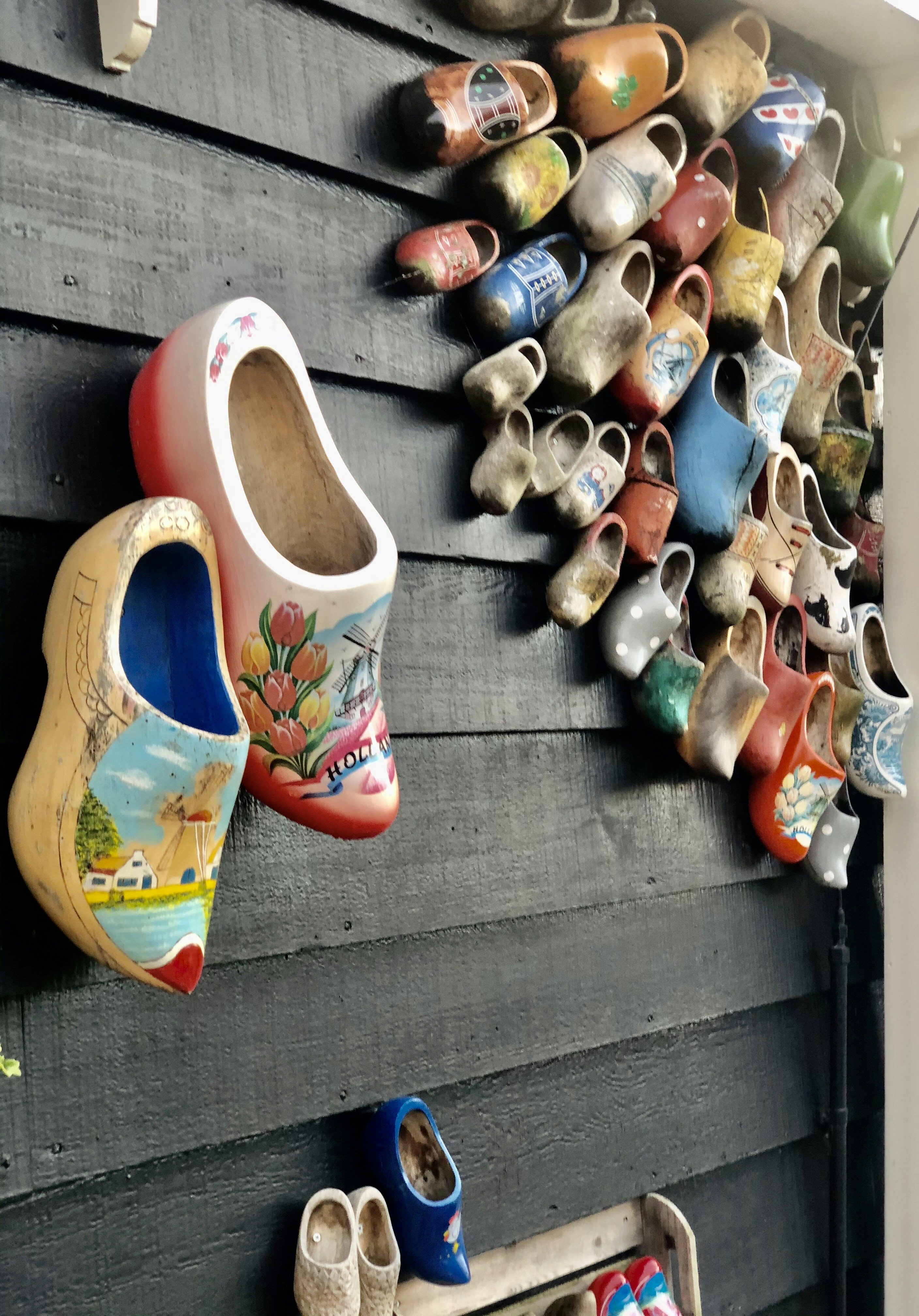 a group of shoes on a shelf