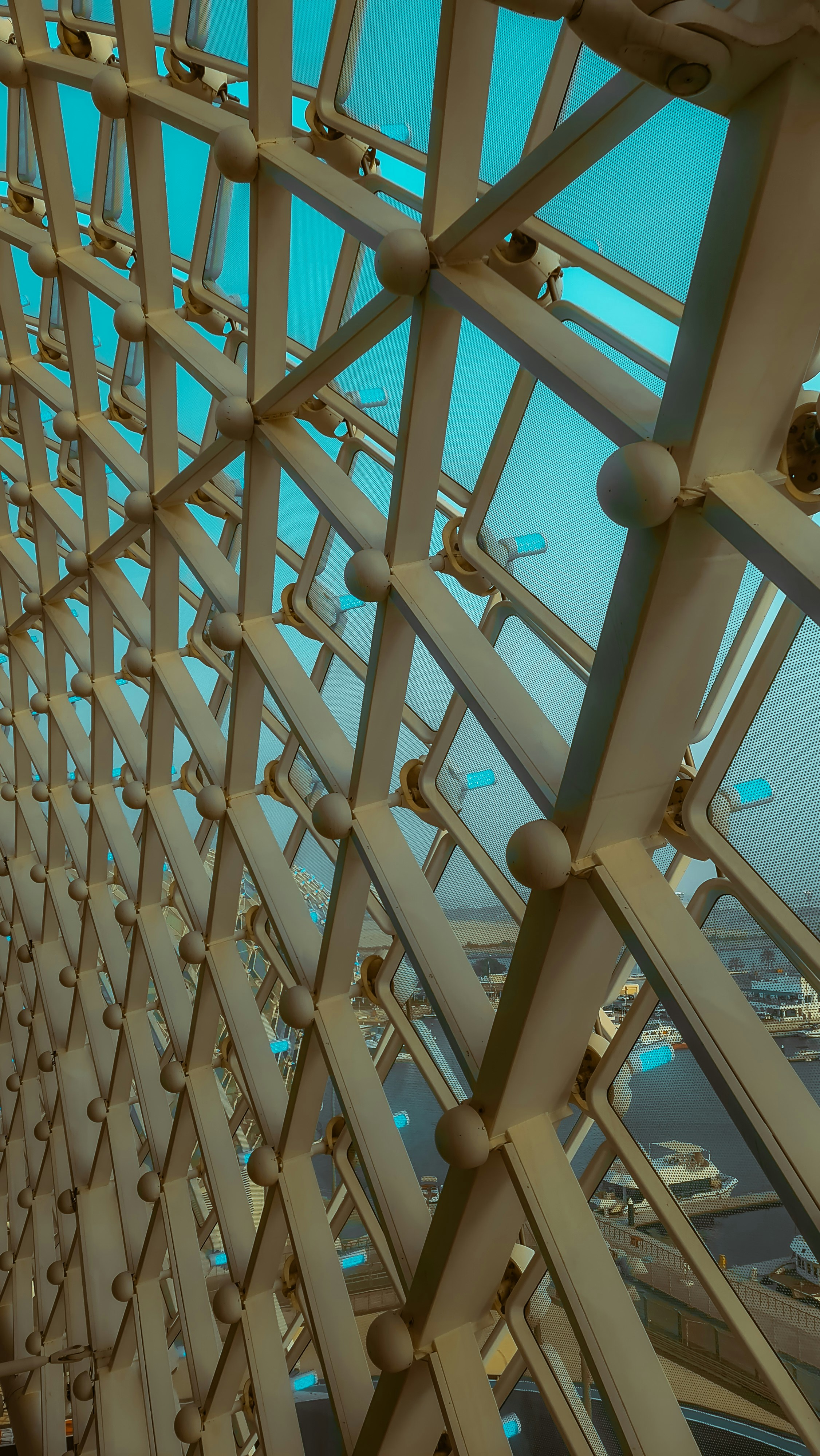 A large glass ceiling with many circular objects photo – Free Yas ...