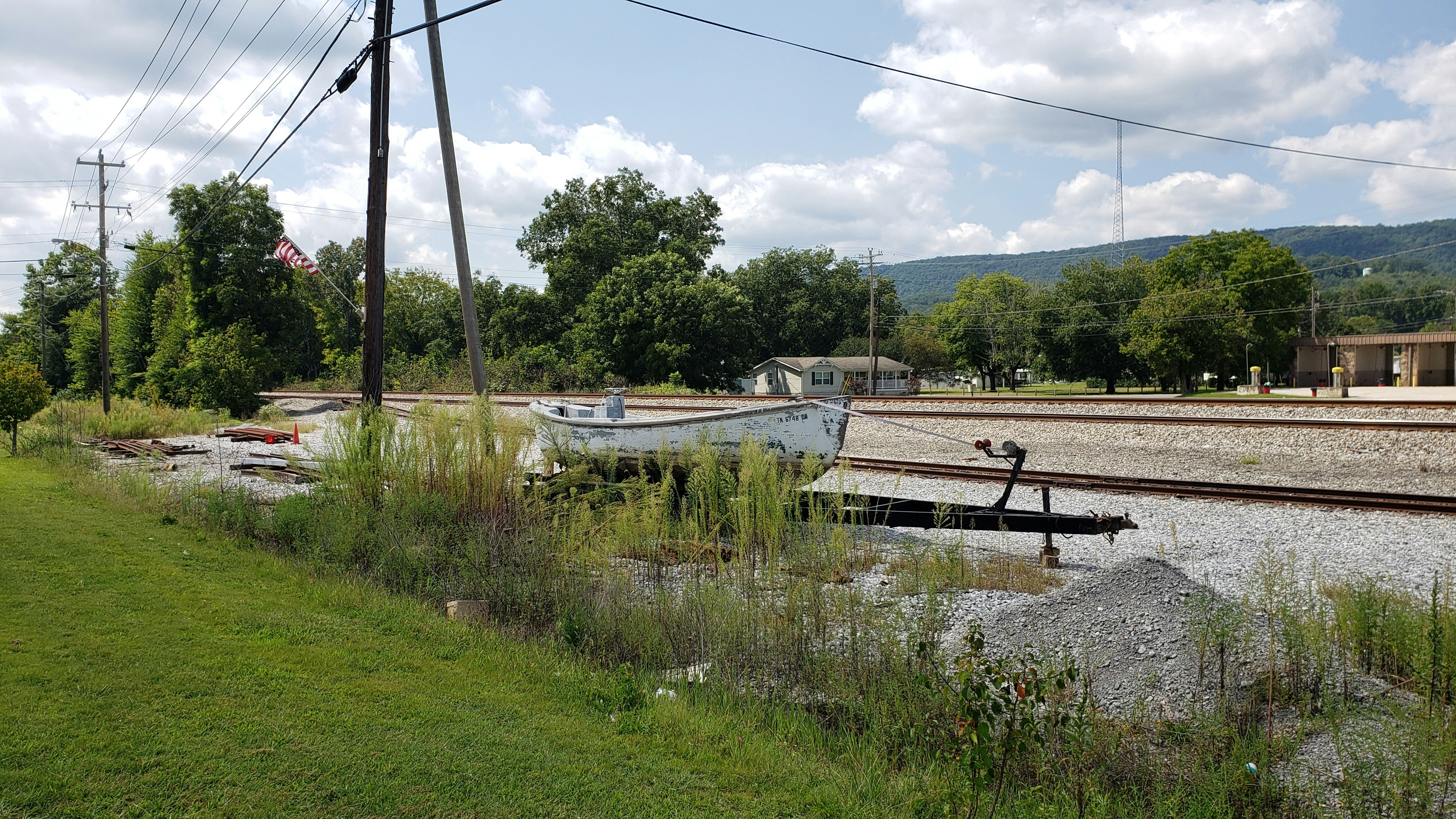 A train track with water on it photo – Free Weathered Image on Unsplash