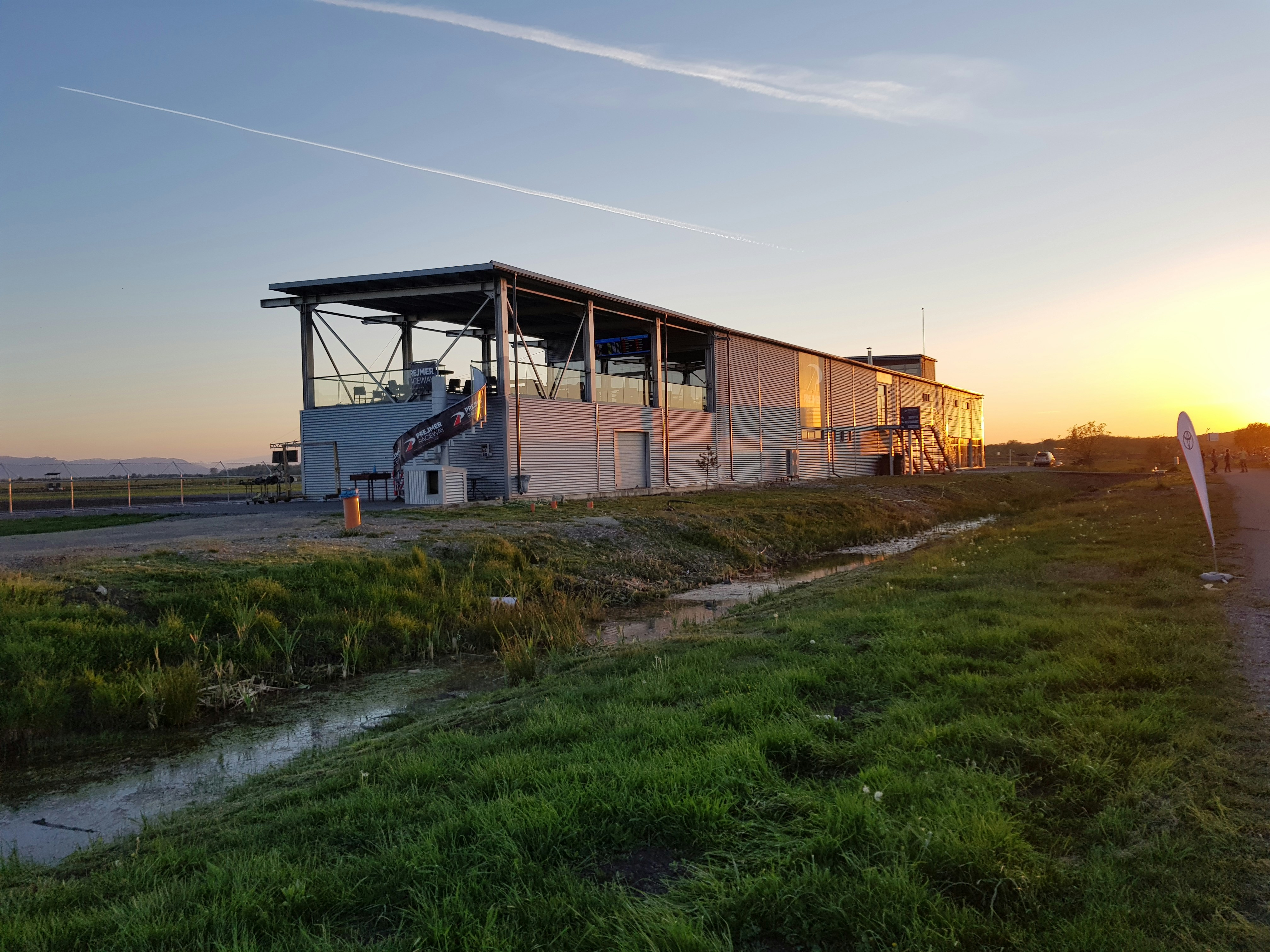 Just a day at the track | a building with a lot of windows