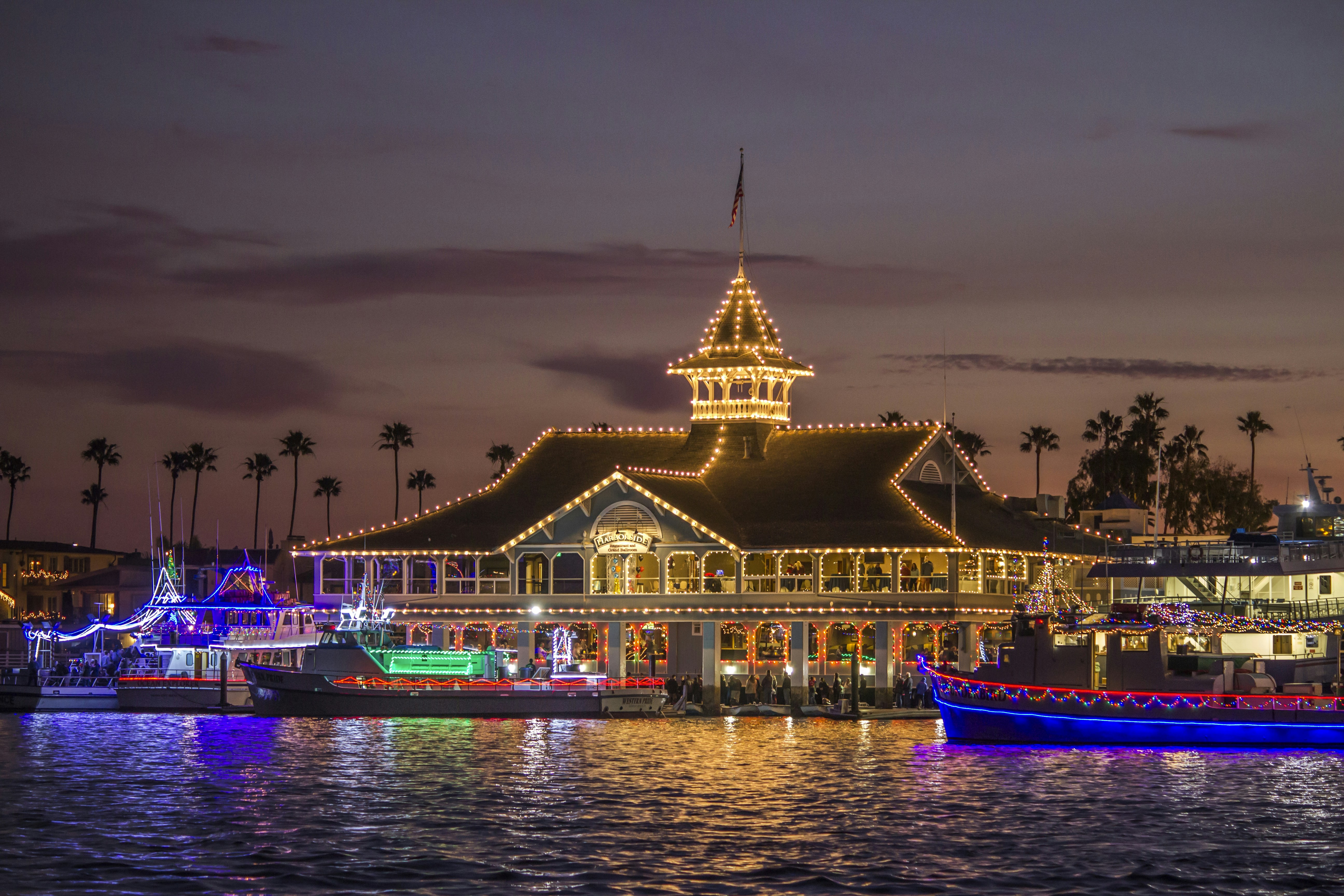 A building with a gold roof and a gold roof by water photo – Free Usa ...