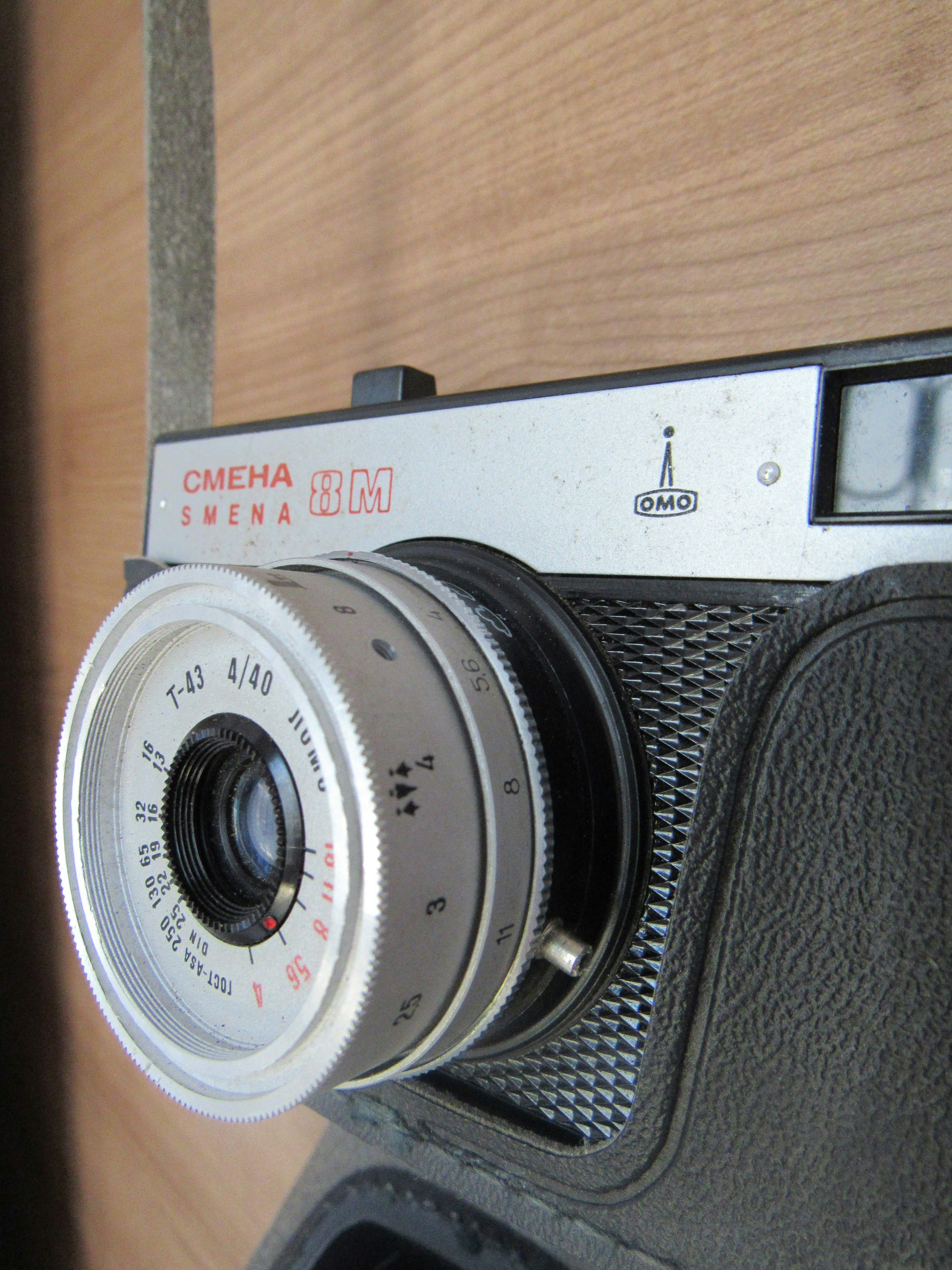 Close-up of a vintage Smena 8M camera showcasing its unique lens and classic design elements.
